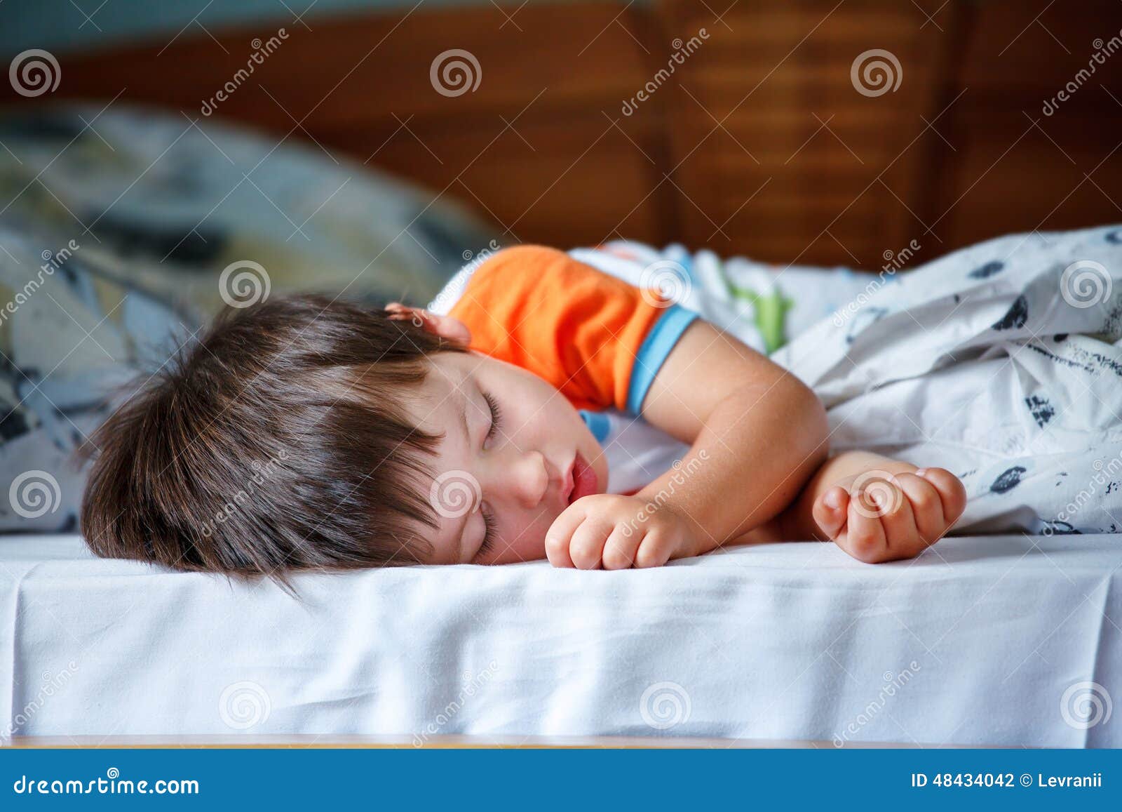 Cute Little Boy Sleeping in a Bed Stock Photo - Image of caucasian ...