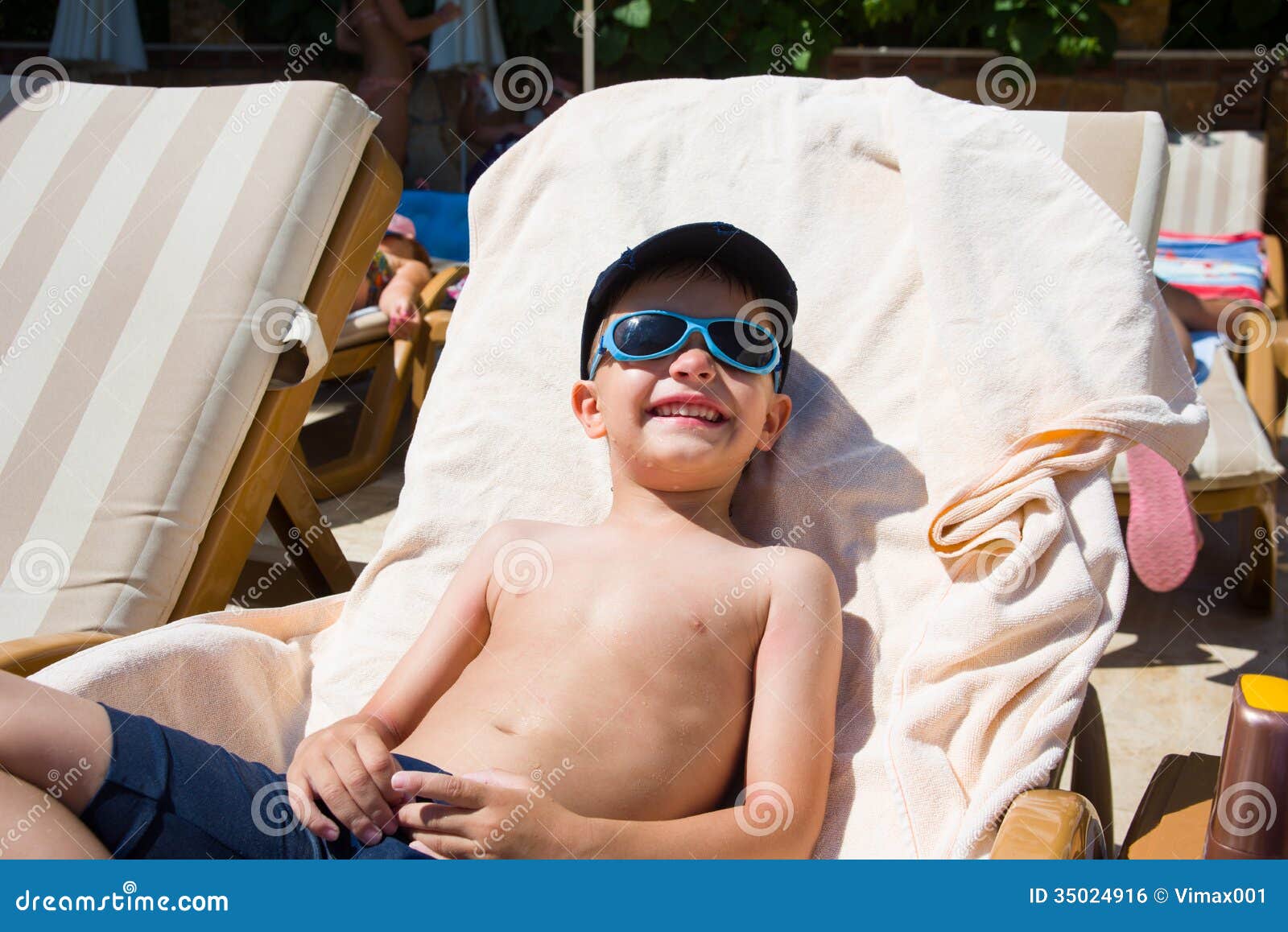 Cute Little Boy Sunbathing at Ocean Beach Stock Photo - Image of summer ...