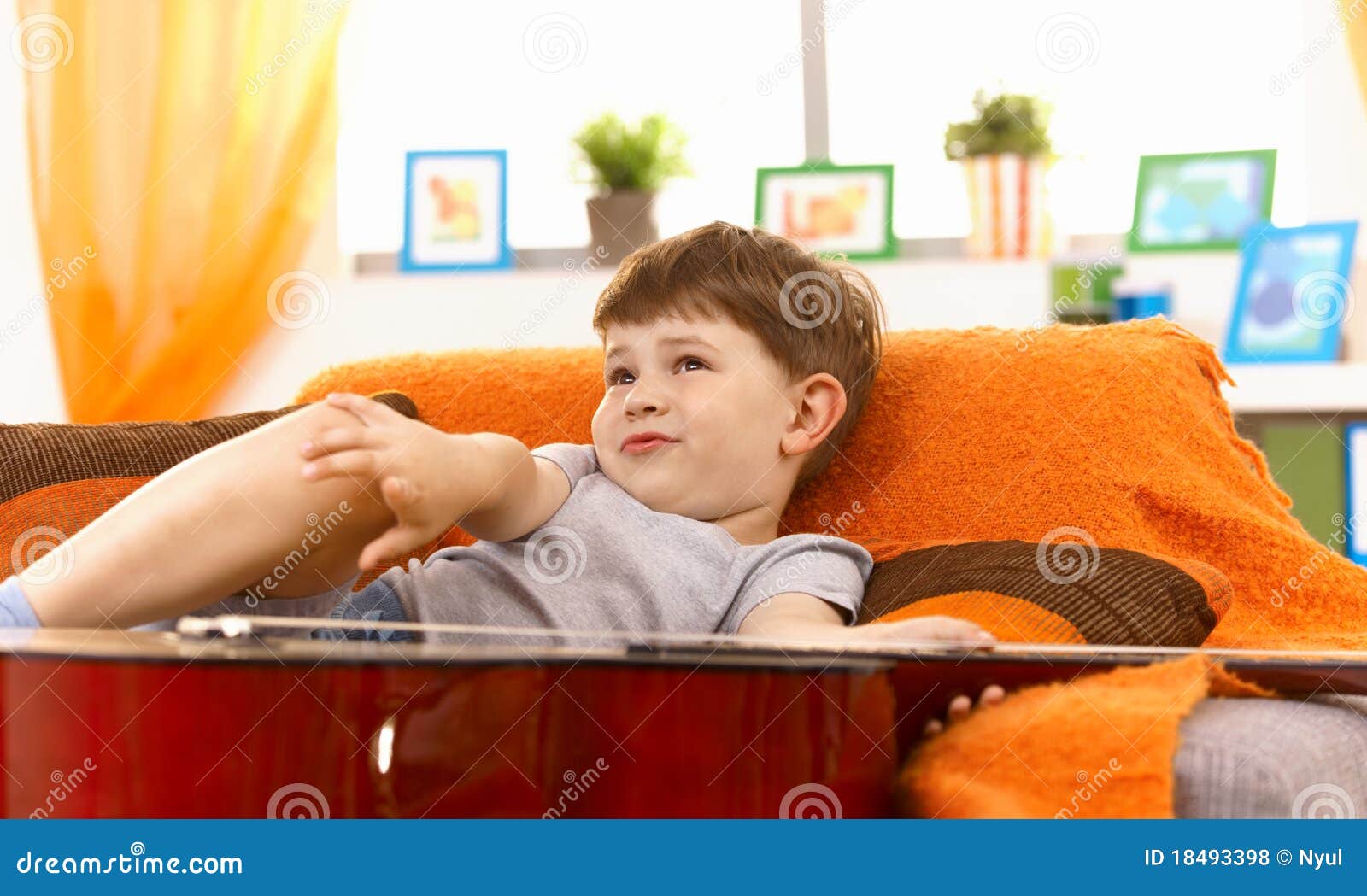 Cute Little Boy Thinking on Couch Stock Photo - Image of children, four ...