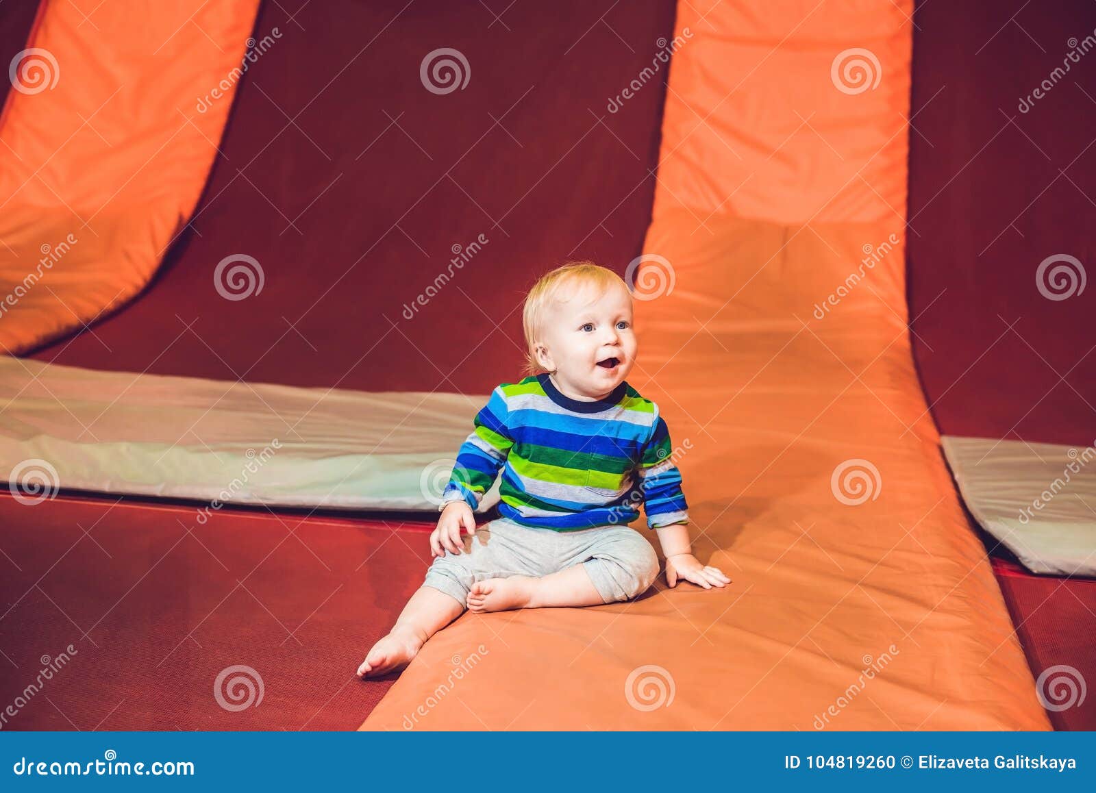 Cute Little Boy on a Trampoline in a Trampoline Center Stock Photo ...