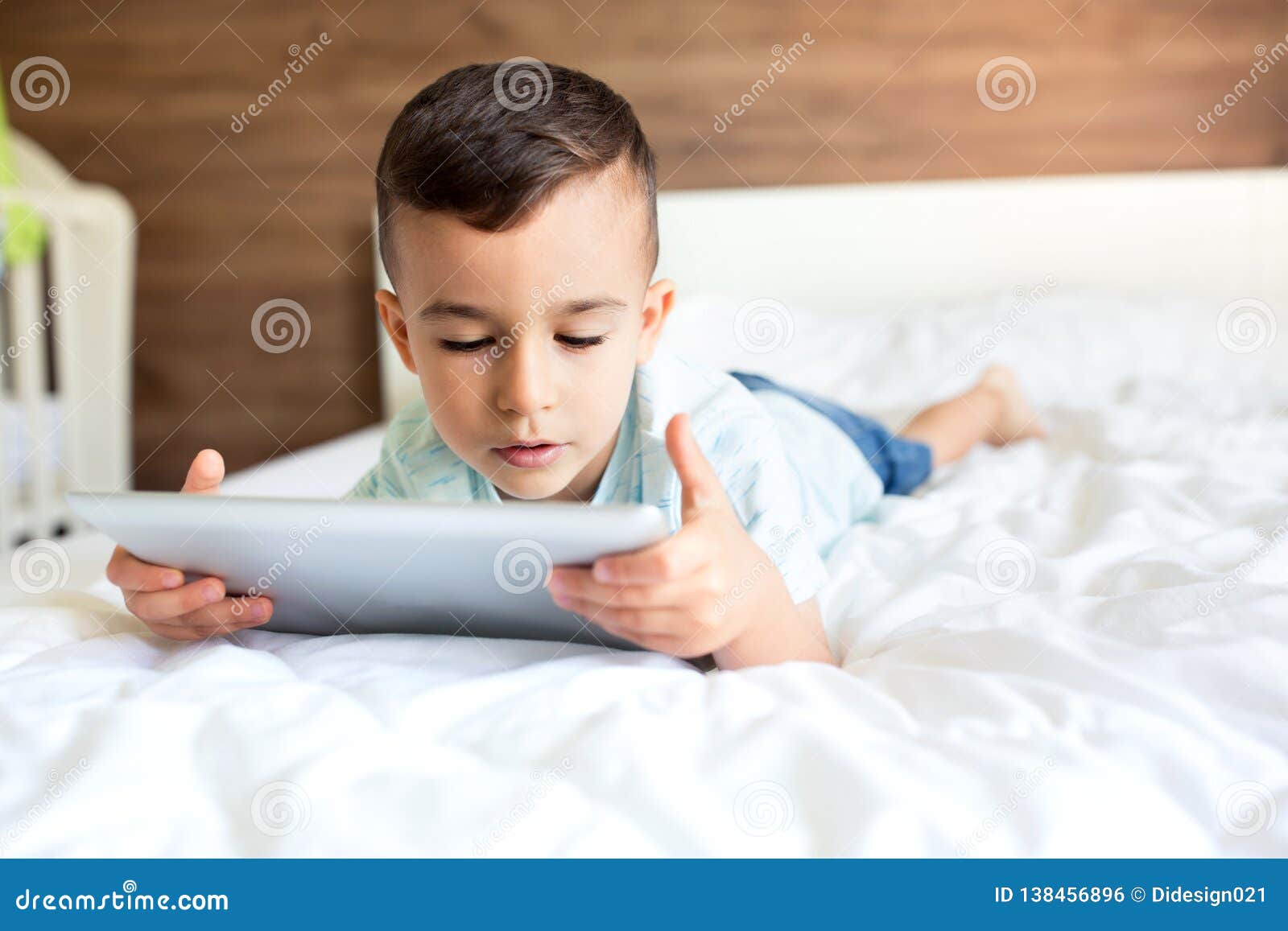 Cute Little Boy Using His Tablet Stock Photo - Image of leisure ...