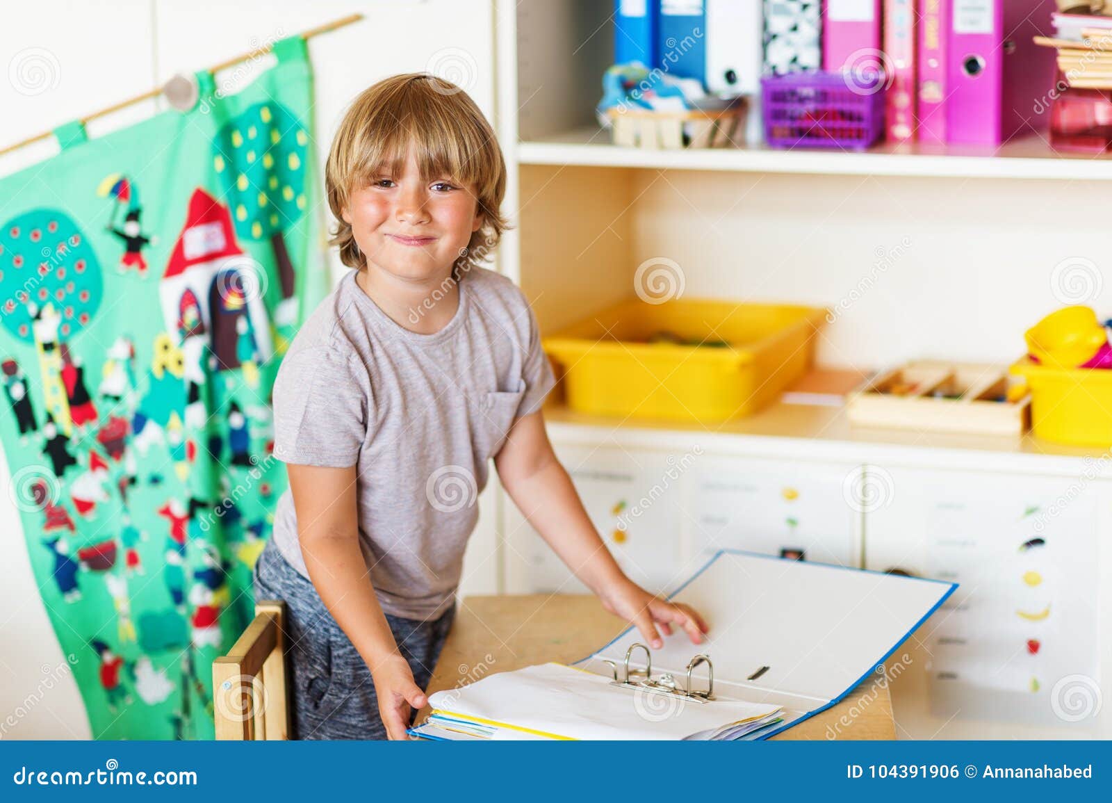 Cute Little Boy Working in Classroom Stock Photo - Image of notes ...