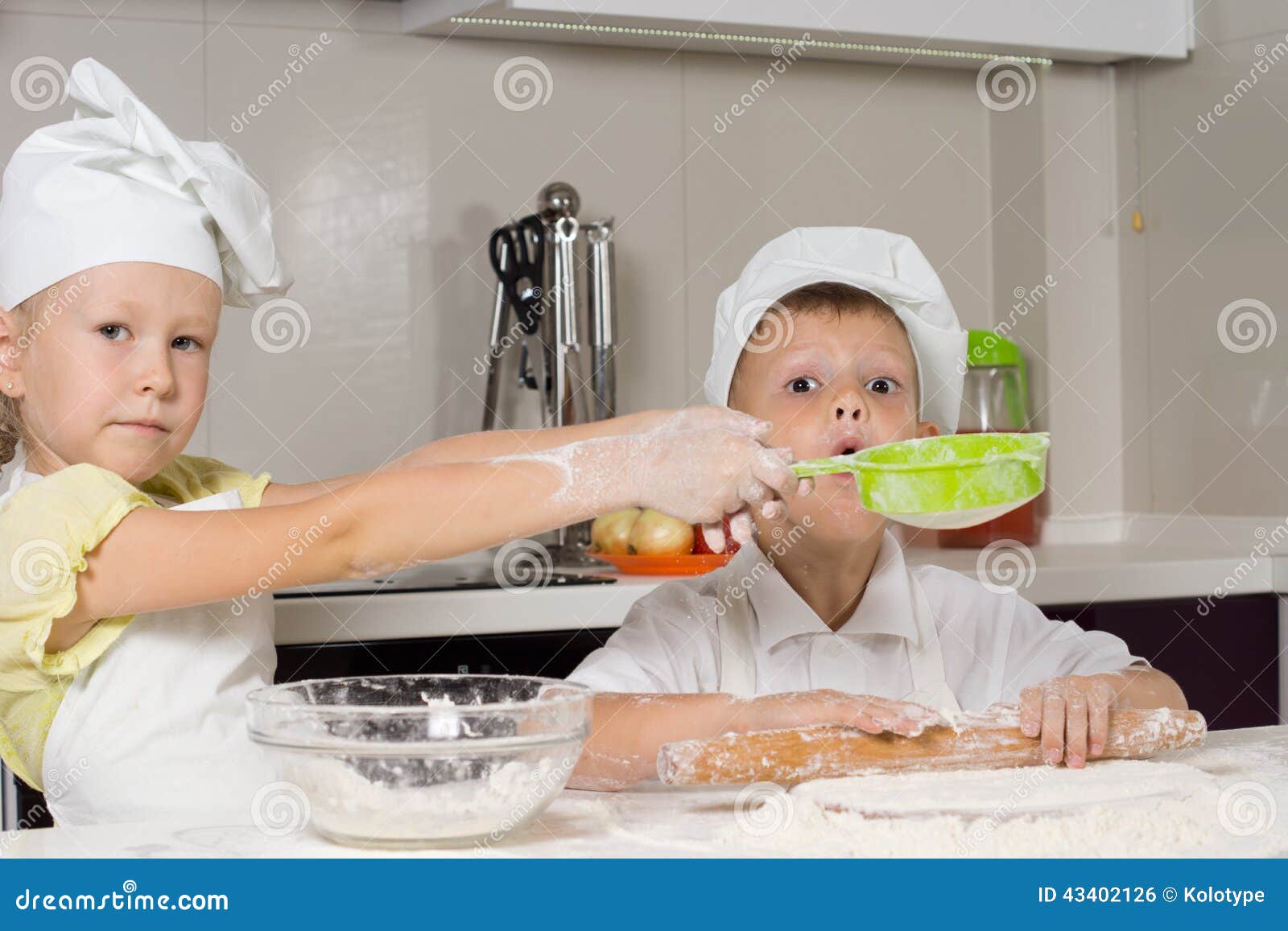 Cute Little Chefs Baking while Playing in Kitchen Stock Photo - Image ...