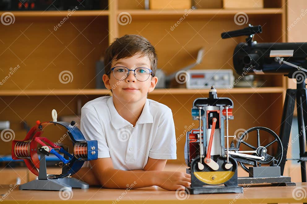 Cute Little Child at Physics Lesson in Classroom Stock Image - Image of ...