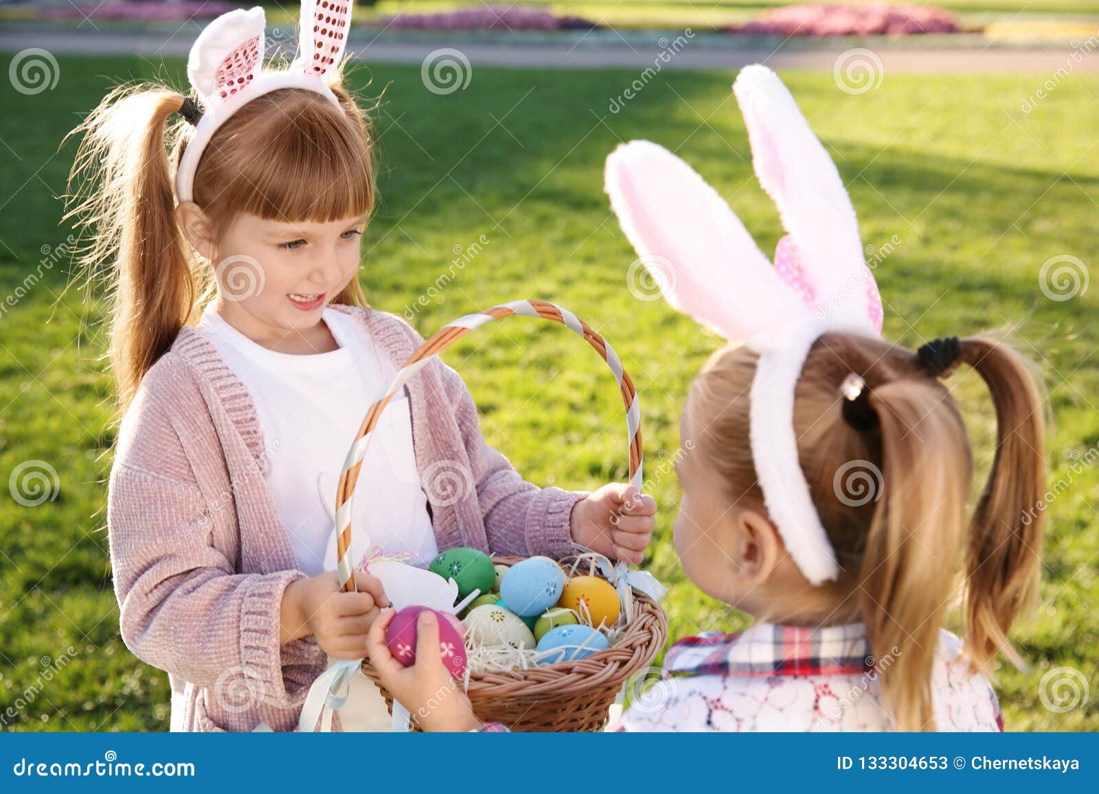Children With Bunny Toys On Blue Background. Sisters Smiling Cute Bunny ...