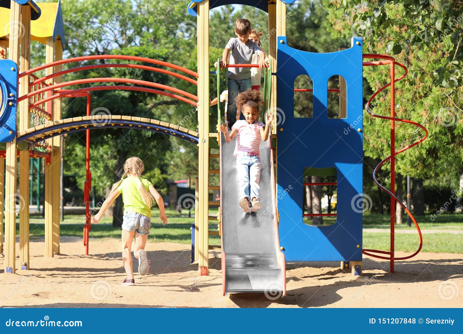 Cute Little Children Having Fun on Playground Outdoors Stock Photo ...