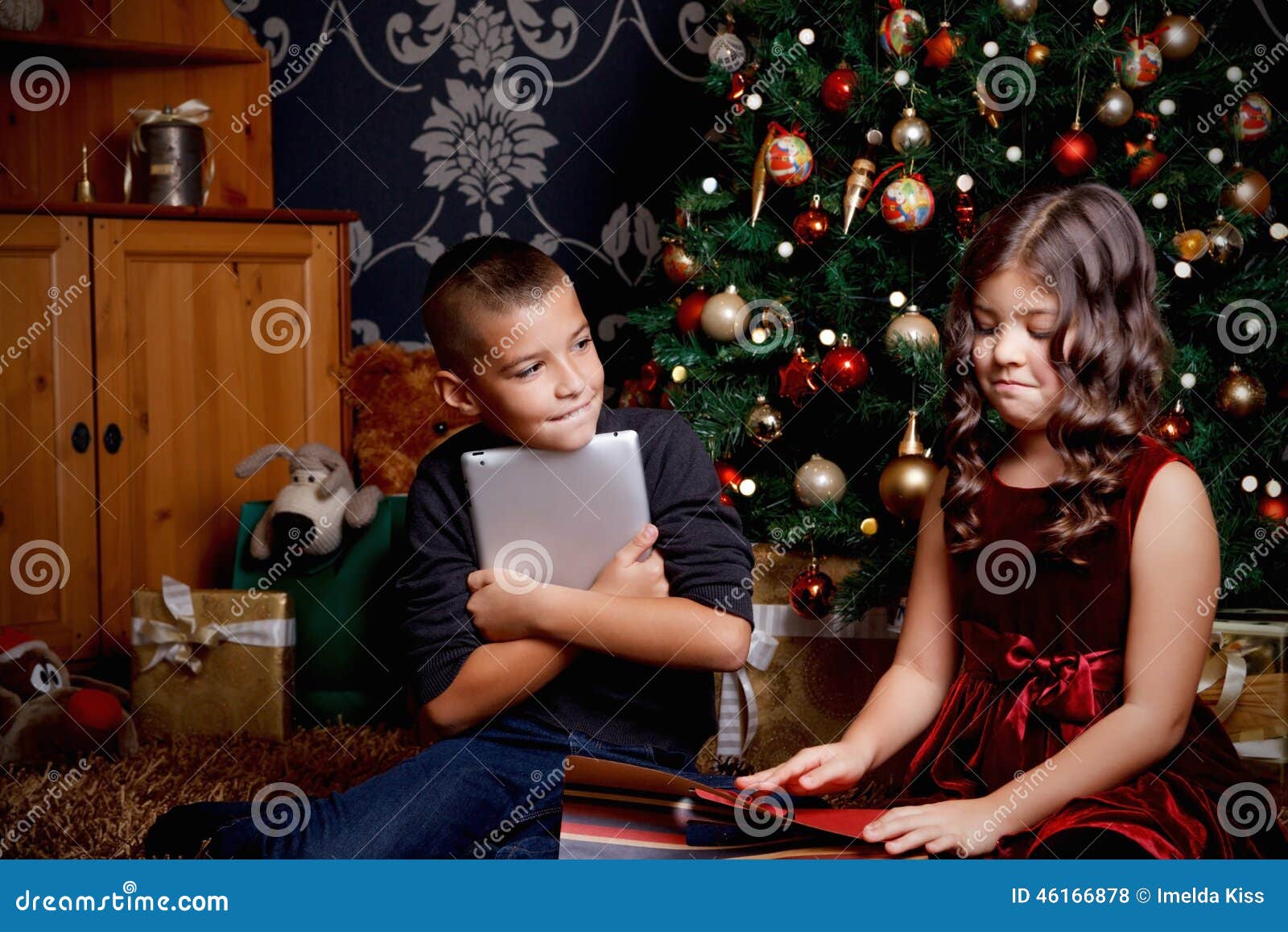 Cute Little Children Opening a Present Stock Photo - Image of decorated ...