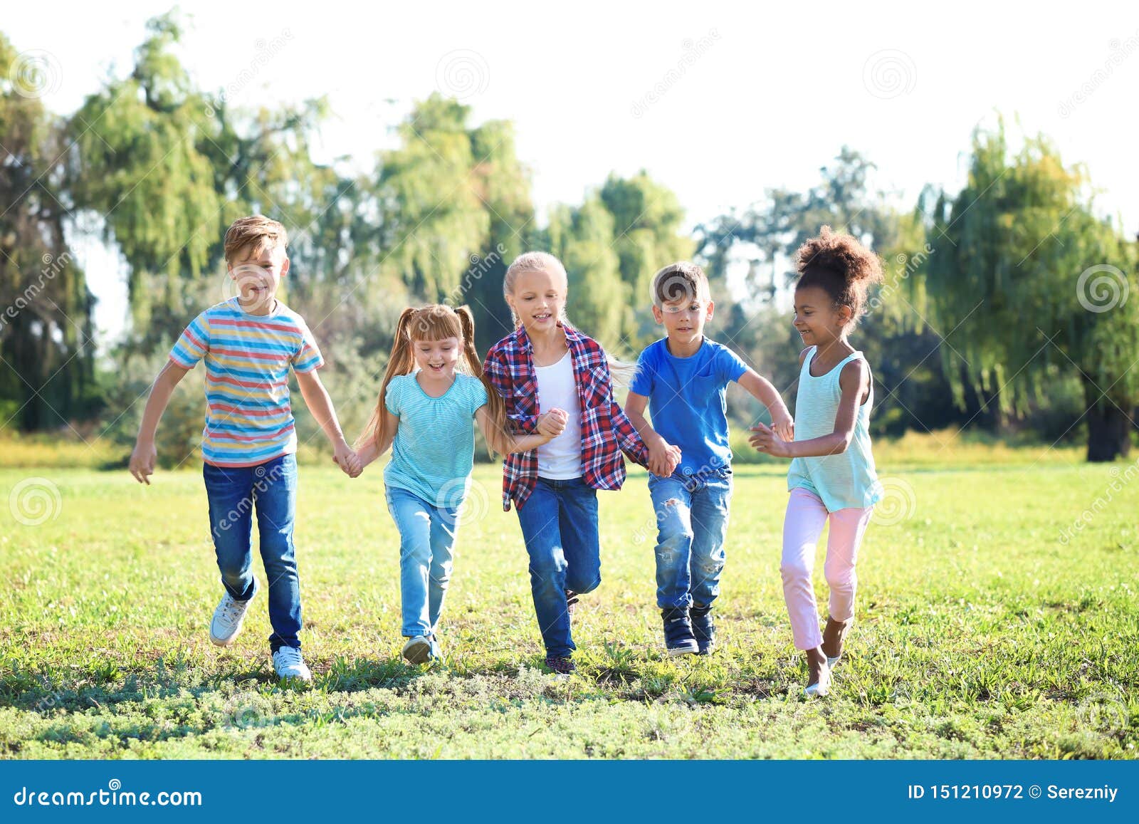 Cute Little Children Playing Outdoors Stock Photo - Image of green ...
