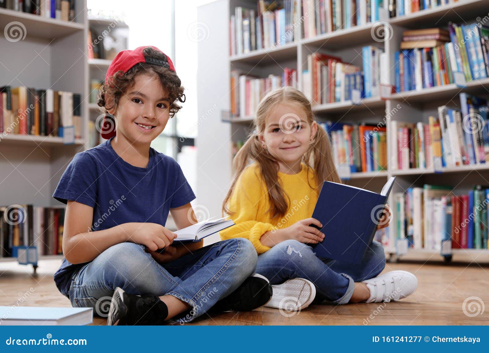 Cute Little Children Reading Books on Floor Stock Image - Image of ...