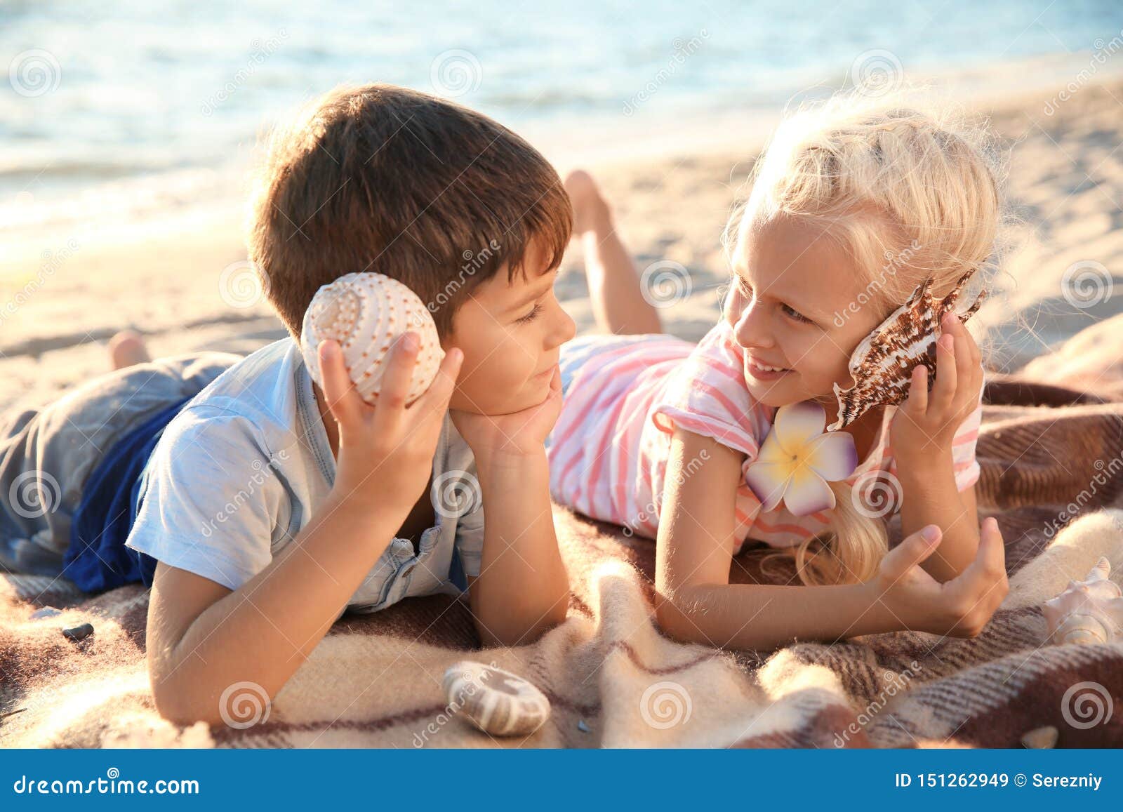 Cute Little Children With Sea Shells On Beach Royalty-Free Stock Photo ...