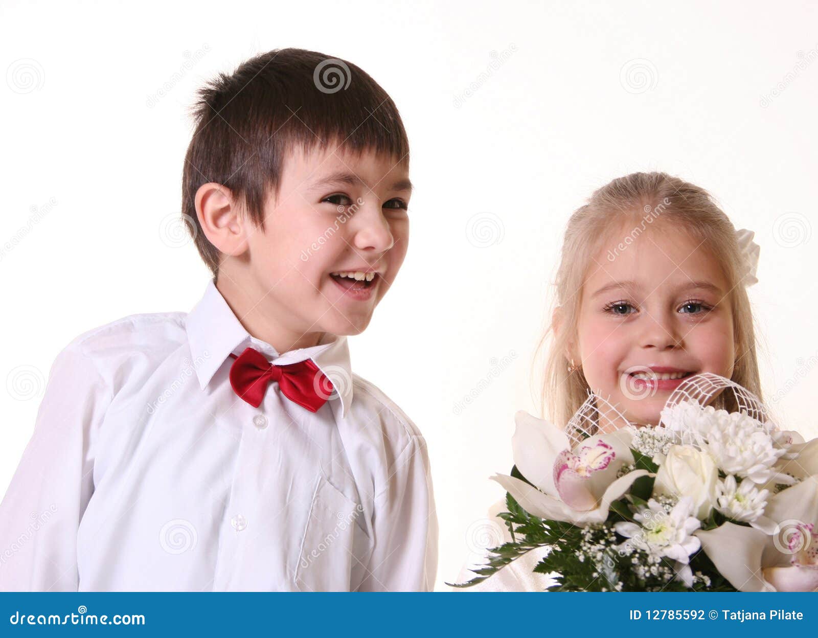 Cute little couple stock photo. Image of childhood, bouquet - 12785592