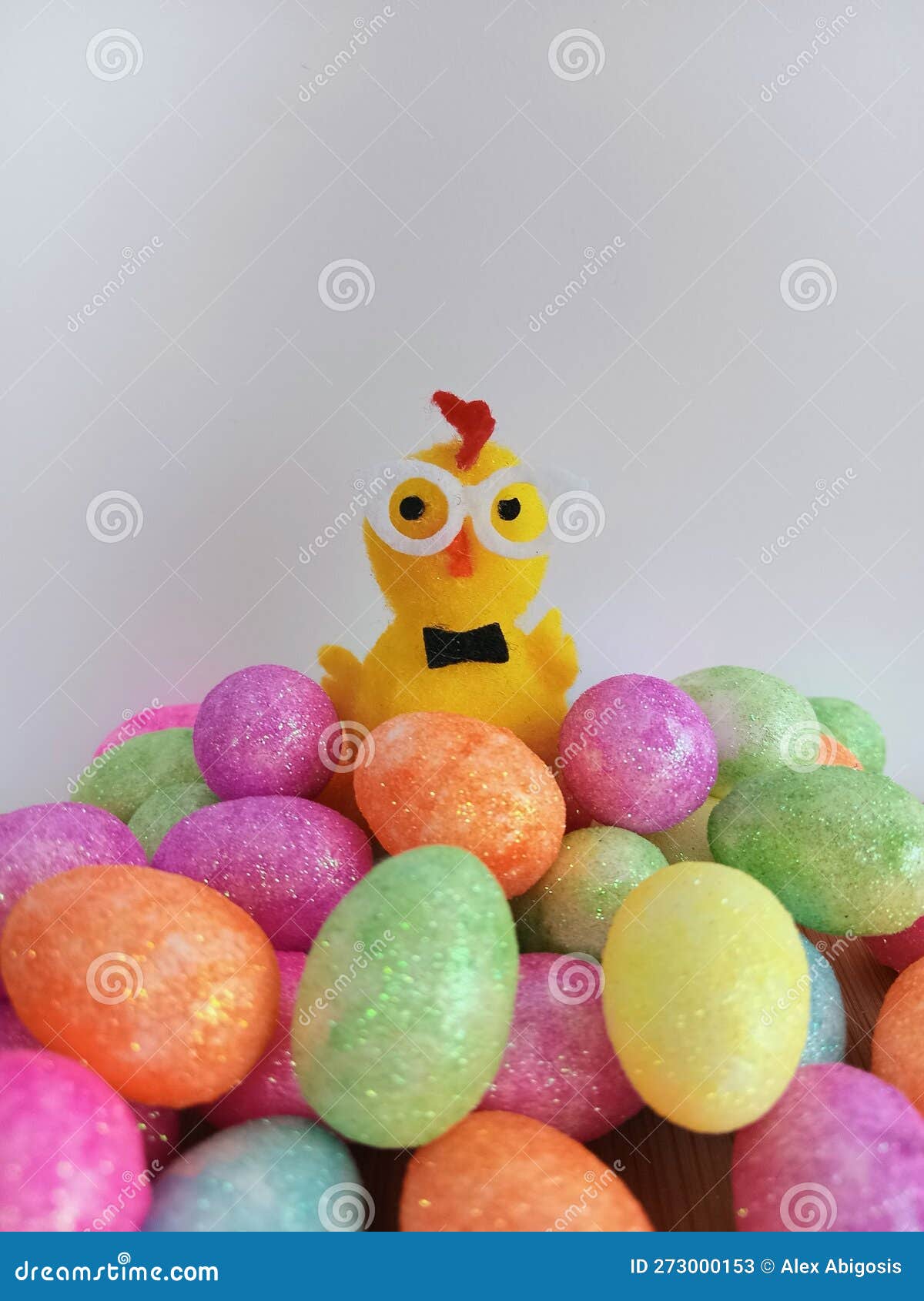 Cute Little Easter Chick Wearing Glasses Surrounded by Colourful Easter ...
