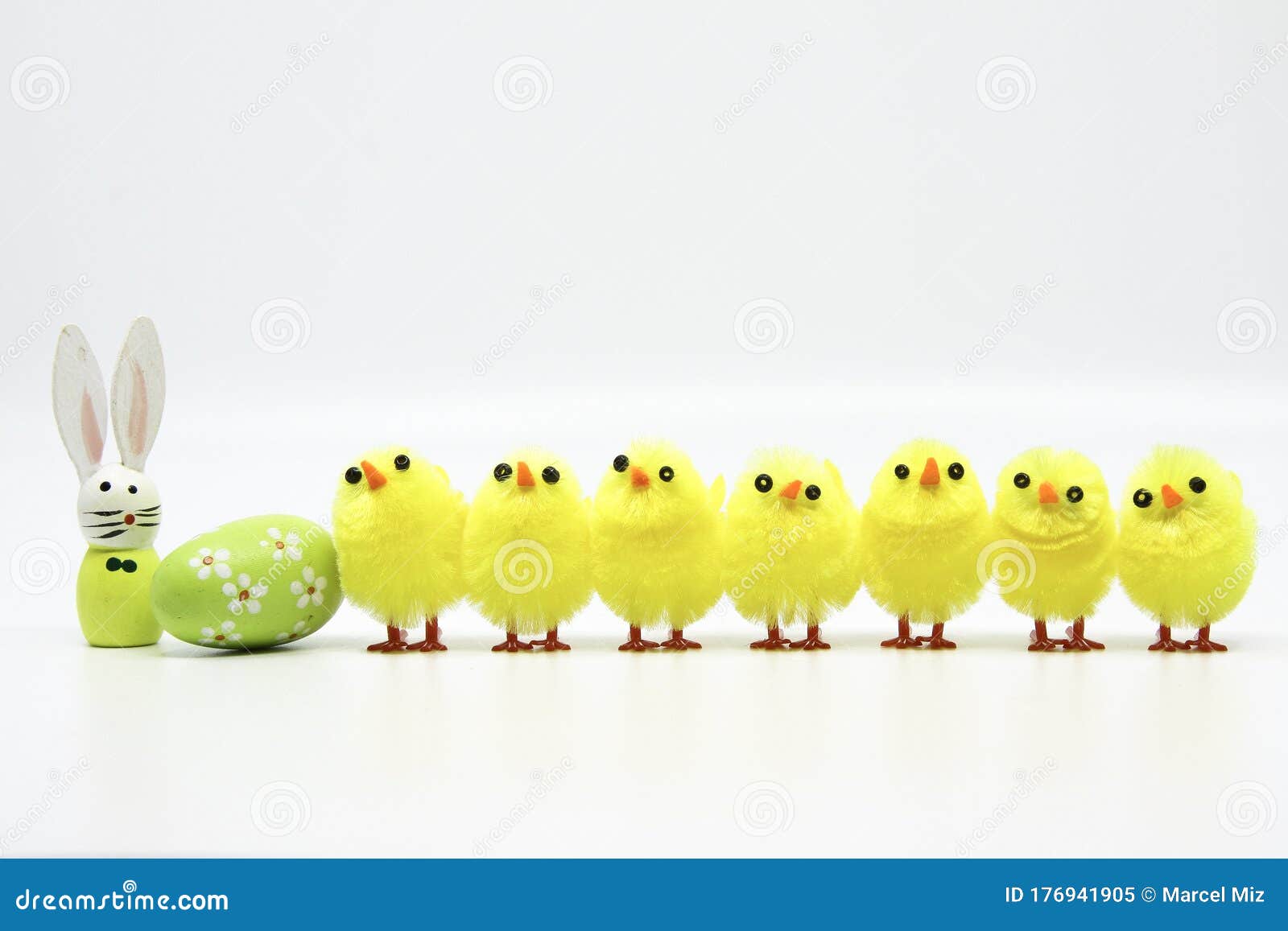 Cute Little Easter Chicks Standing in a Row with an Easter Egg and ...