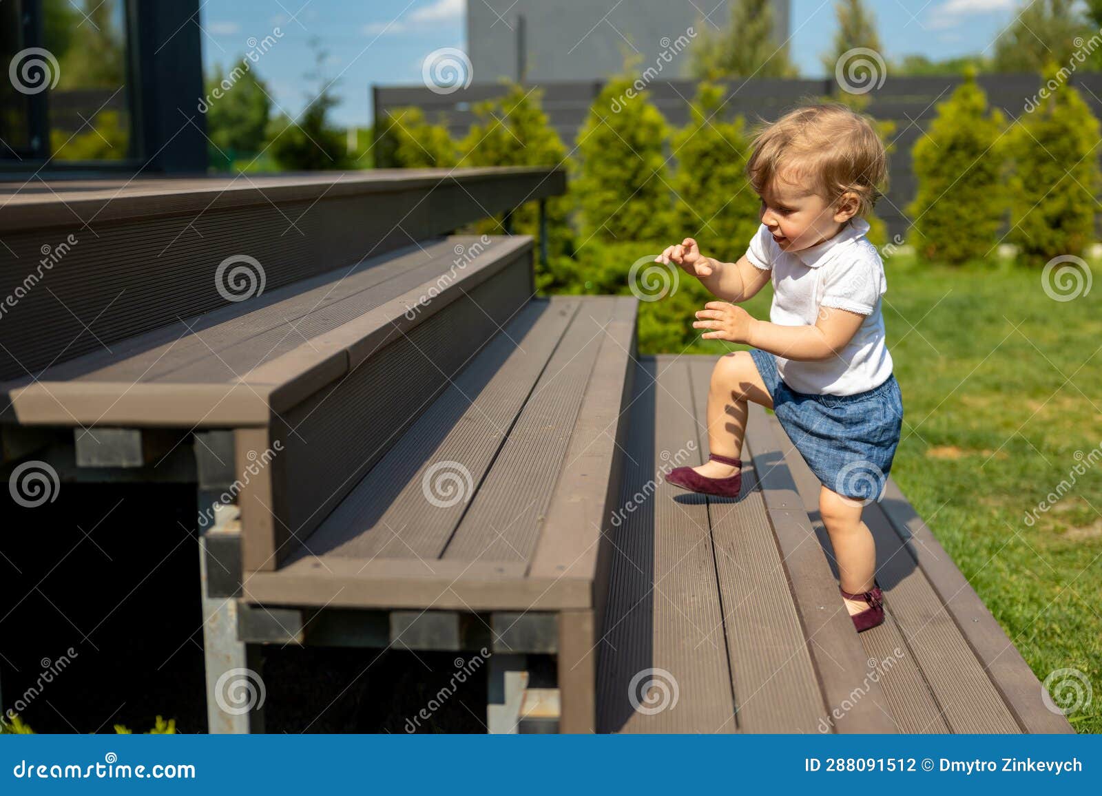 Cute Little Fair-haired Kid on the Steps Stock Photo - Image of ...