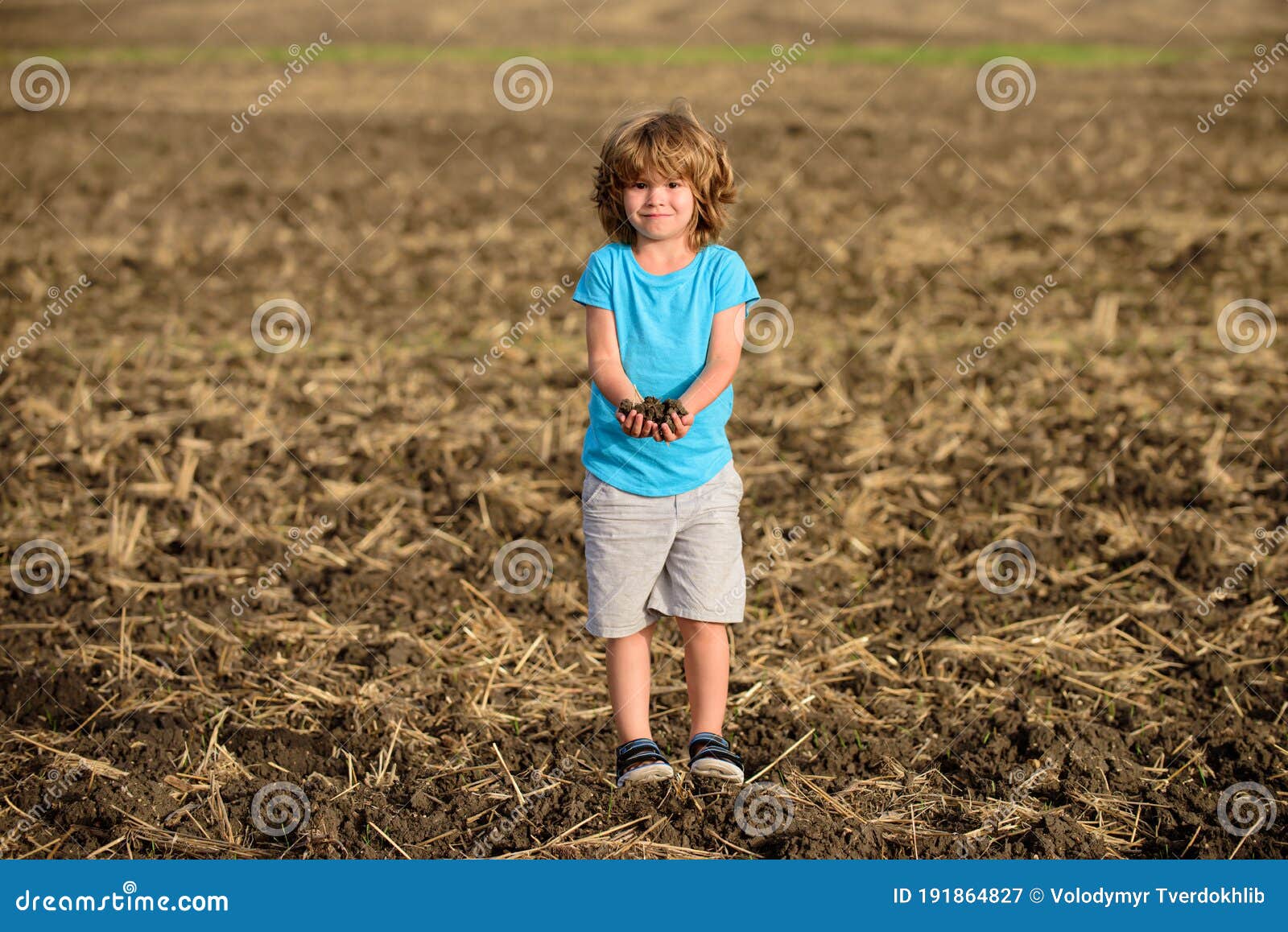 Cute Little Farmer Working on Field. Humus Soil. Stock Image - Image of ...
