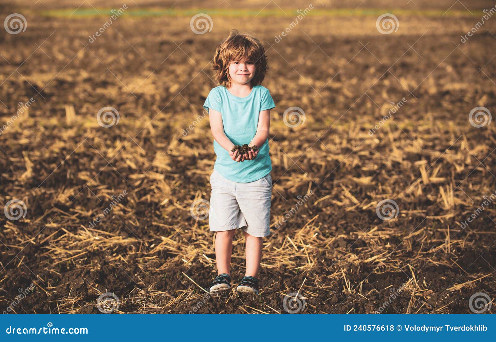 Cute Little Farmer Working on Field. Humus Soil. Stock Photo - Image of ...