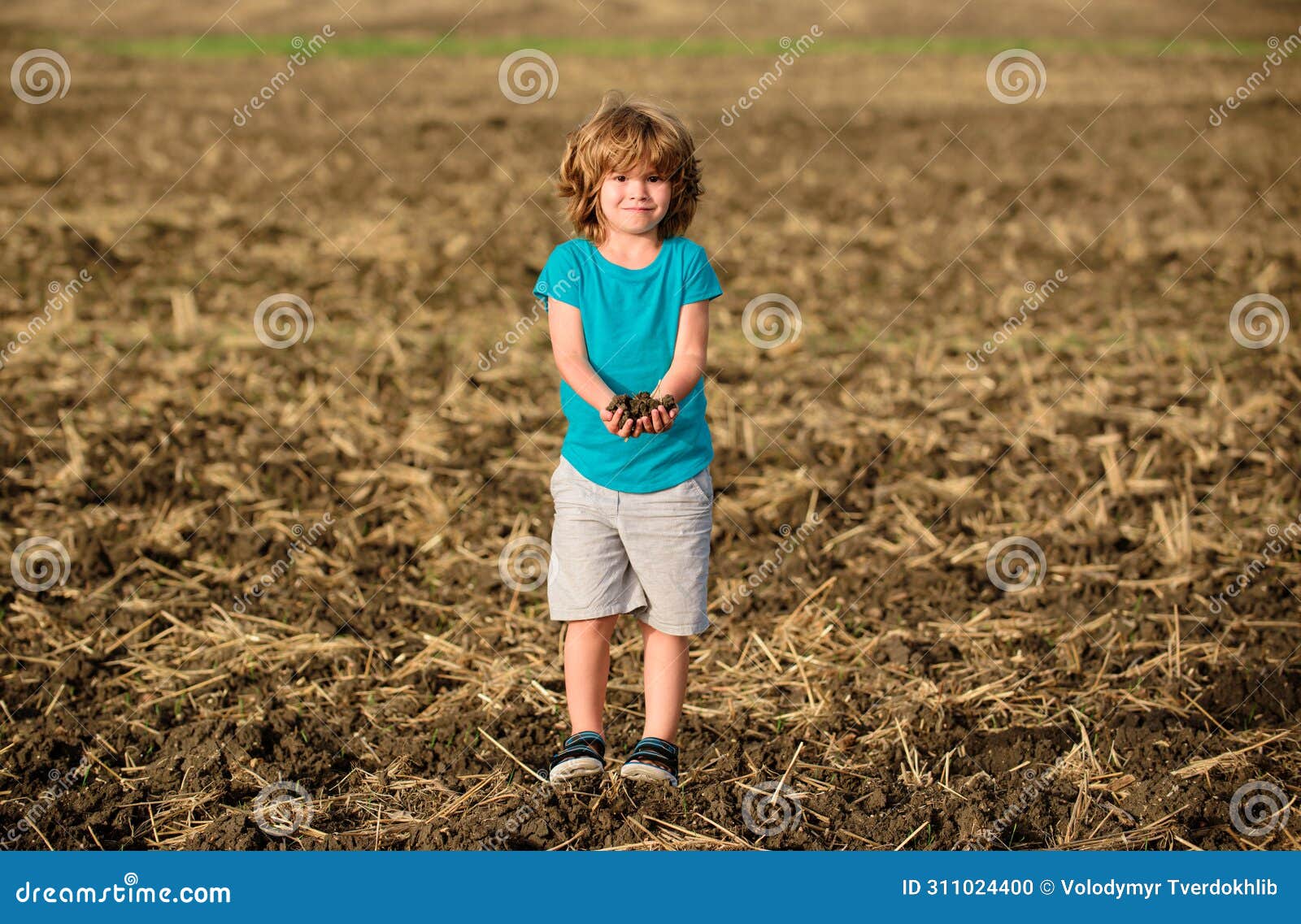 Cute Little Farmer Working on Field. Humus Soil. Stock Photo - Image of ...