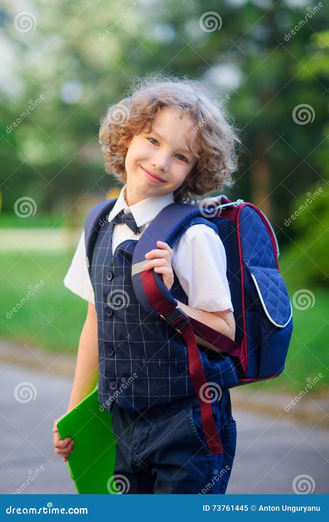 Cute Little First Grader is in the School Yard. Stock Image - Image of ...