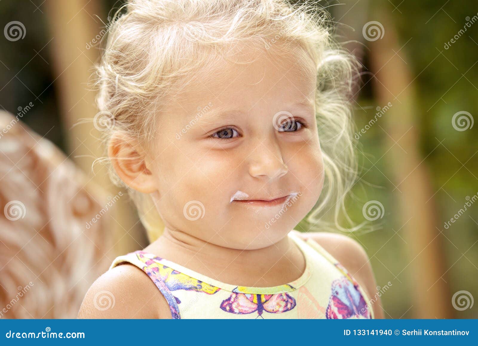 Cute Little Girl Child With Traces Of Ice Cream On Her Face On A Stock ... Cute Little Girl Child With Traces Of Ice Cream On Her Face On A Stock ...