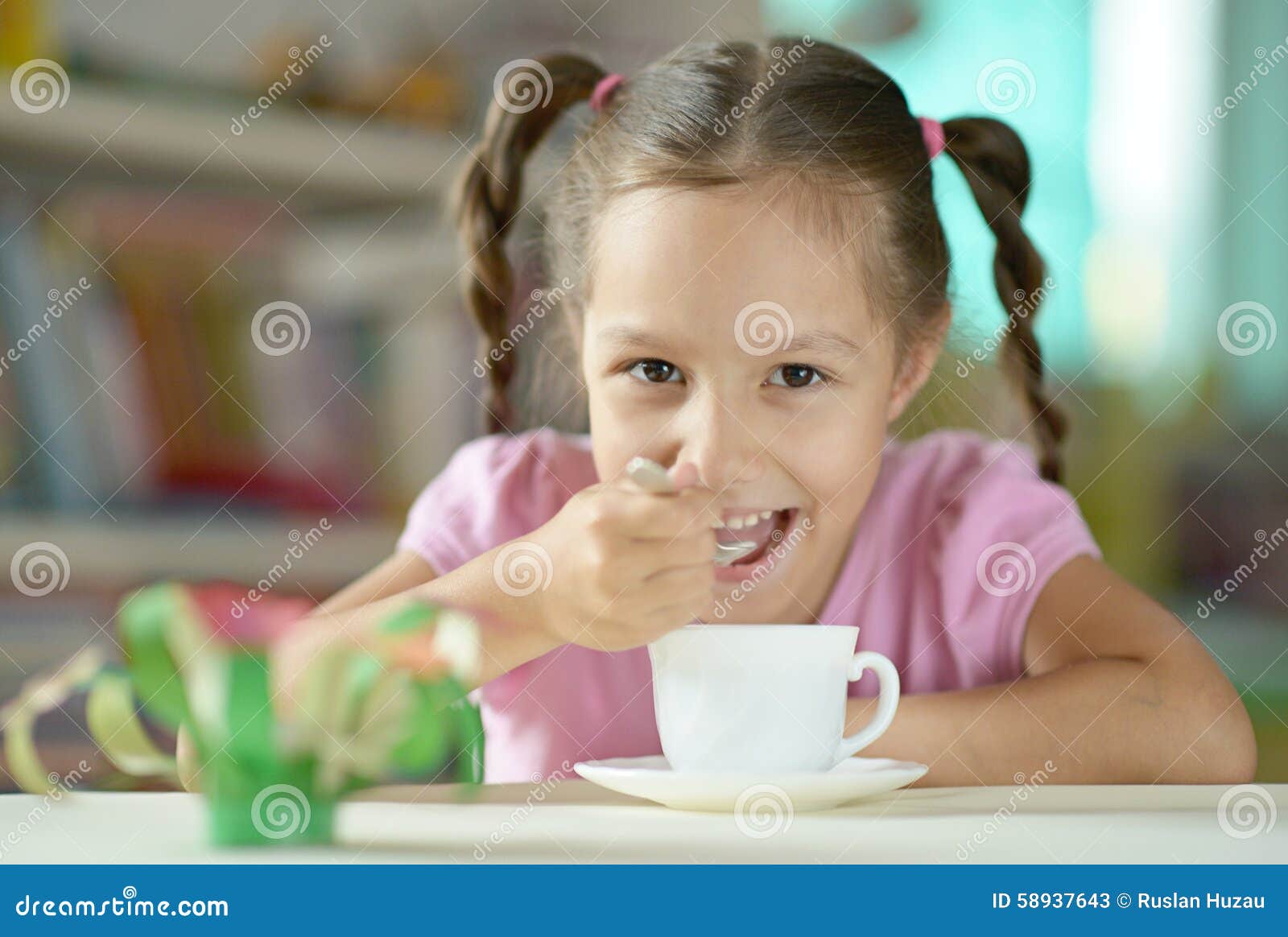 Cute little girl with cup stock image. Image of lifestyle - 58937643