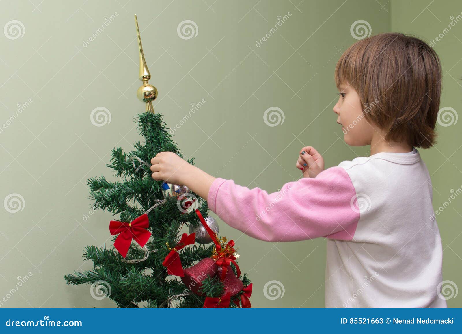 Cute Little Girl Decorating Christmas Tree Stock Image - Image of ...