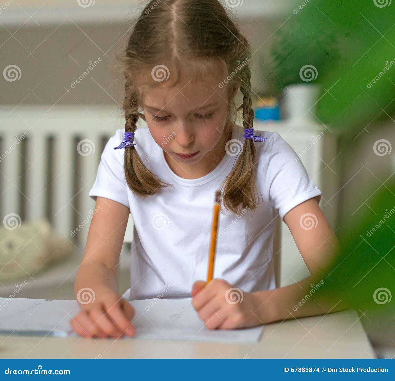 Cute Little Girl Doing Her Homework. Stock Photo - Image of notebook ...