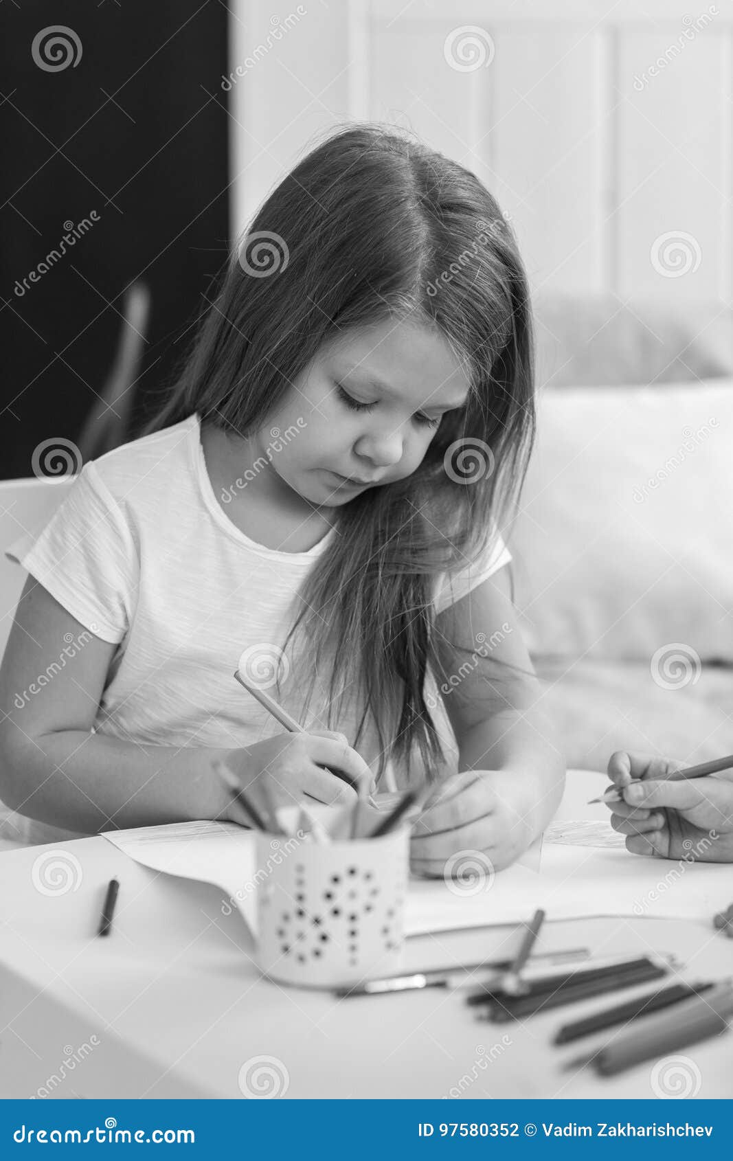 Cute Little Girl is Drawing while Spending Time at Home Stock Photo ...