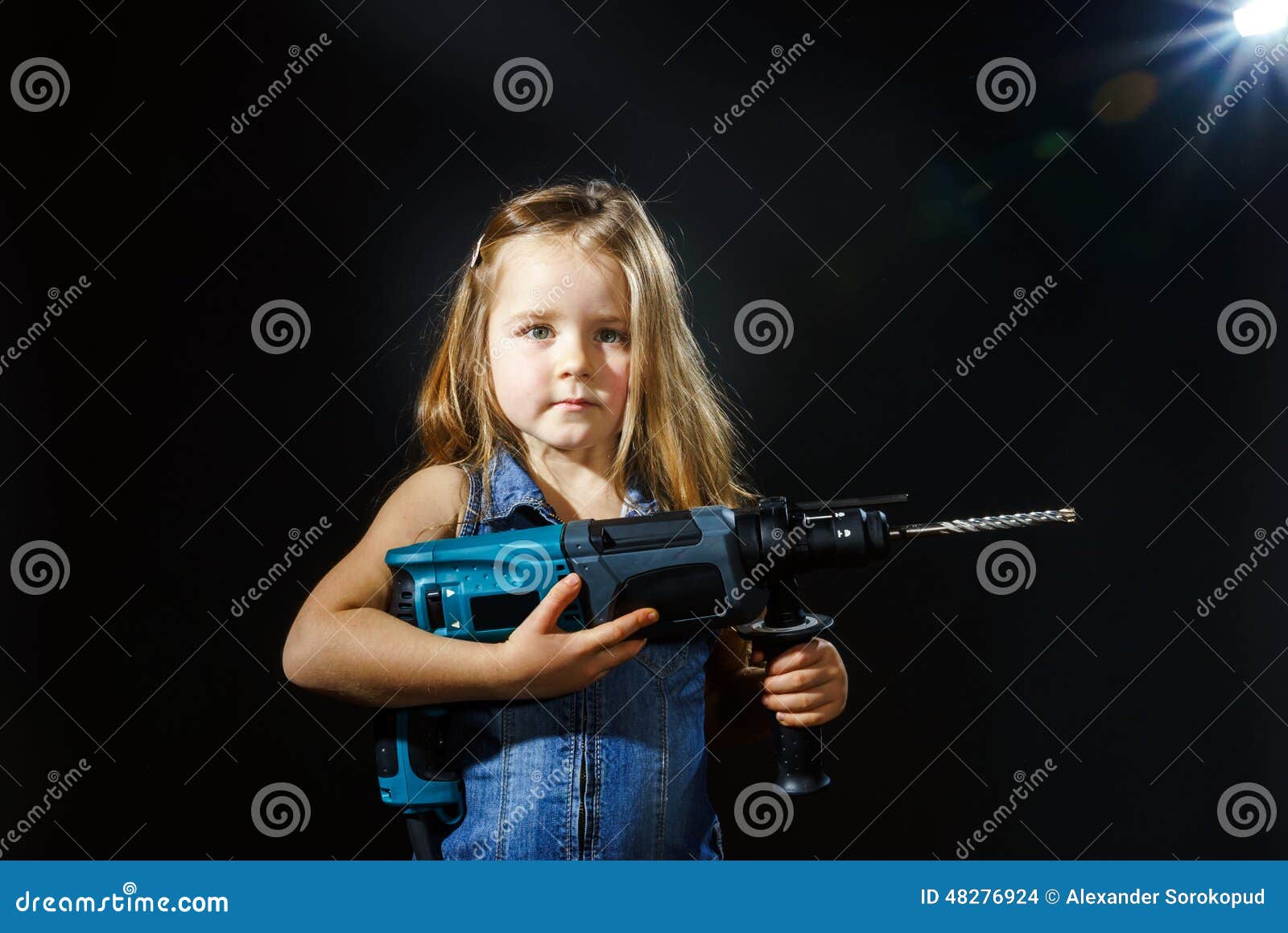 Cute Little Girl with Drilling Machine in Her Hands Stock Photo - Image ...