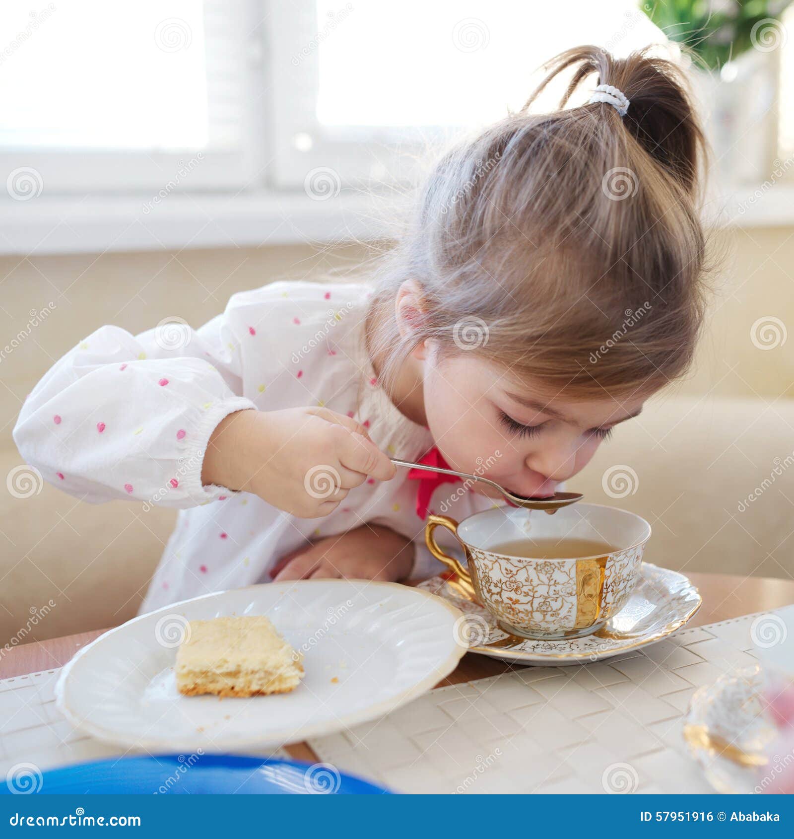 Cute Little Girl Drinks Tea Stock Photo - Image of portrait, child ...