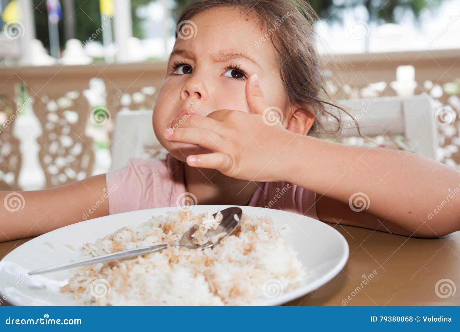 Cute Little Girl Eats Rice in a Summer Cafe Stock Photo - Image of asia ...