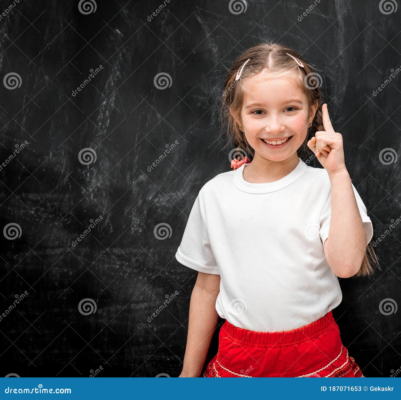 Cute little girl with idea stock image. Image of chalk - 187071653