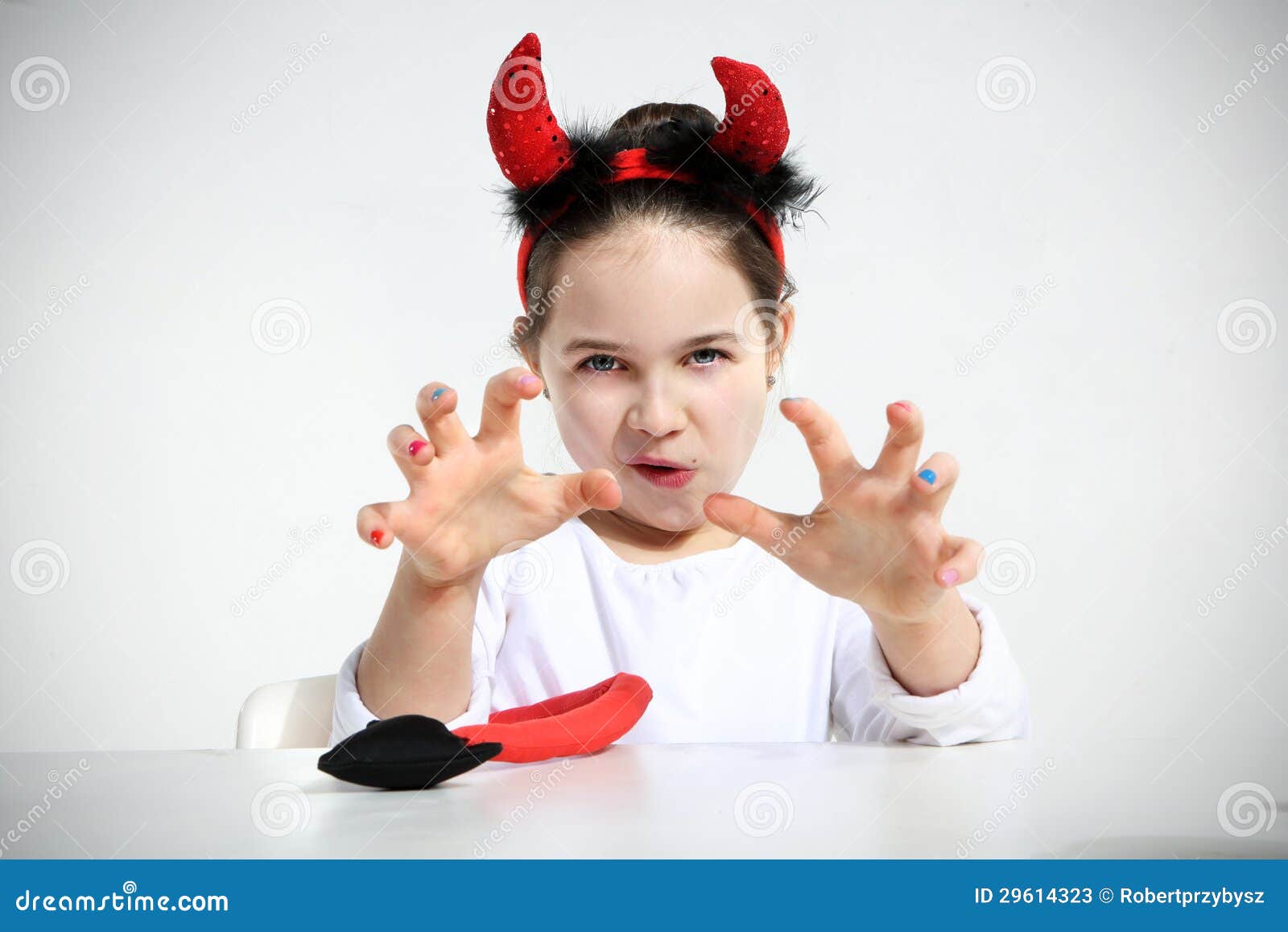 Cute little girl in imp stock image. Image of studio - 29614323
