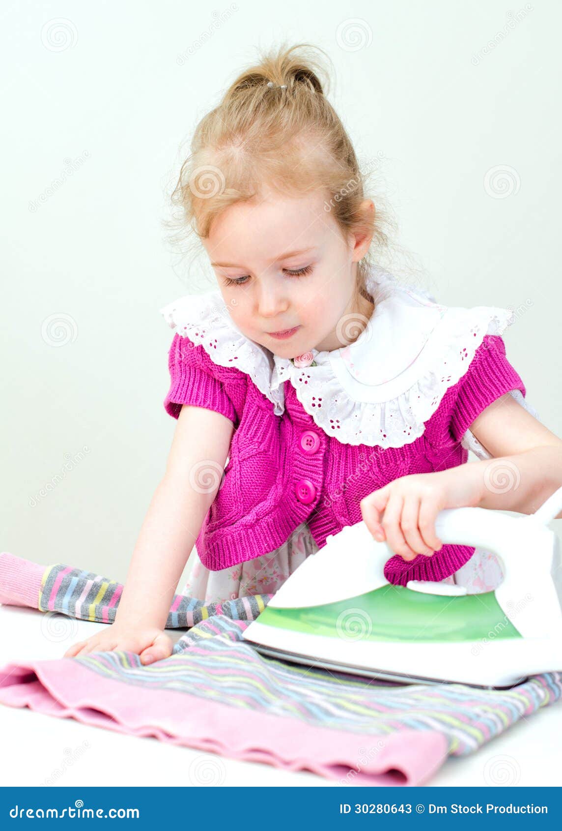 Child ironing clothes stock image. Image of looking, female - 30280643
