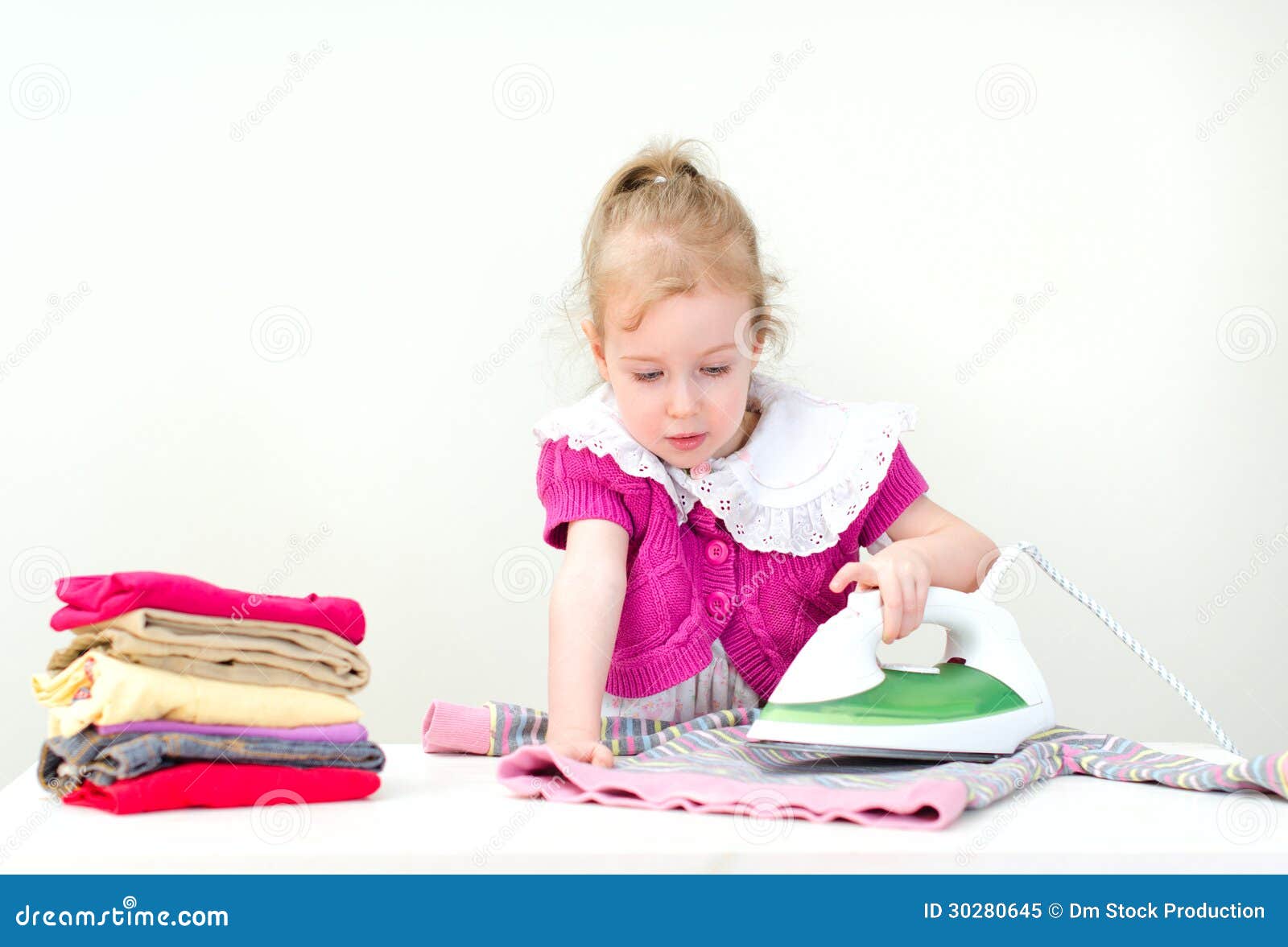 Child ironing clothes stock image. Image of home, childhood - 30280645