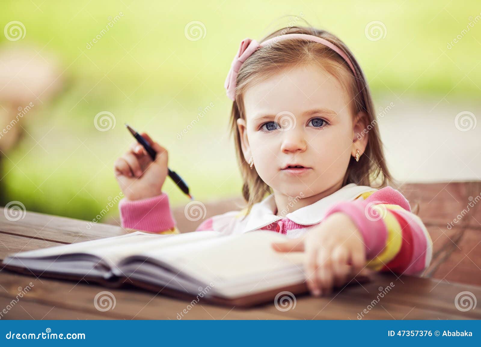 Cute Little Girl Learning To Write Stock Photo - Image of house, female ...