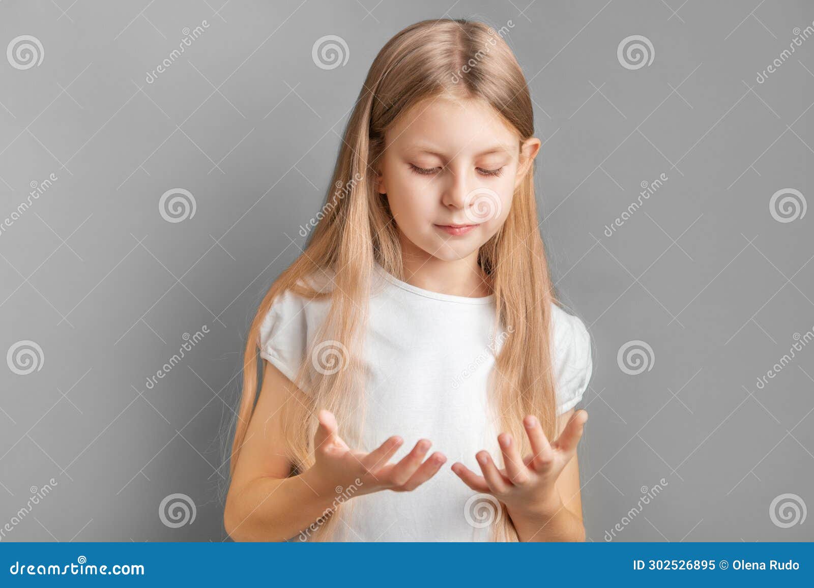 Cute Little Girl Looking at Her Hands Stock Image - Image of asking ...