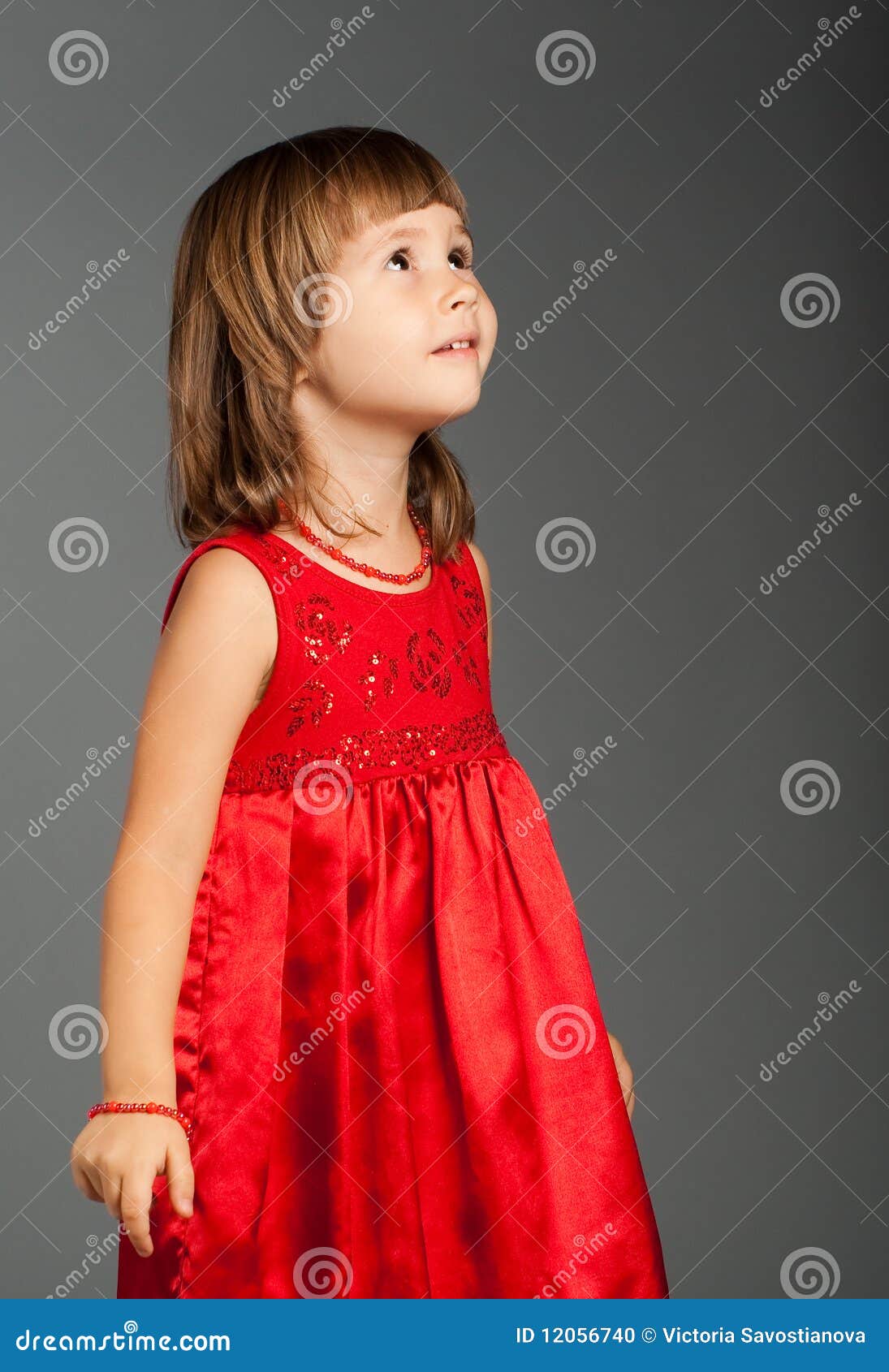 Cute Little Girl Looking Up Stock Photo - Image of happy, girl: 12056740
