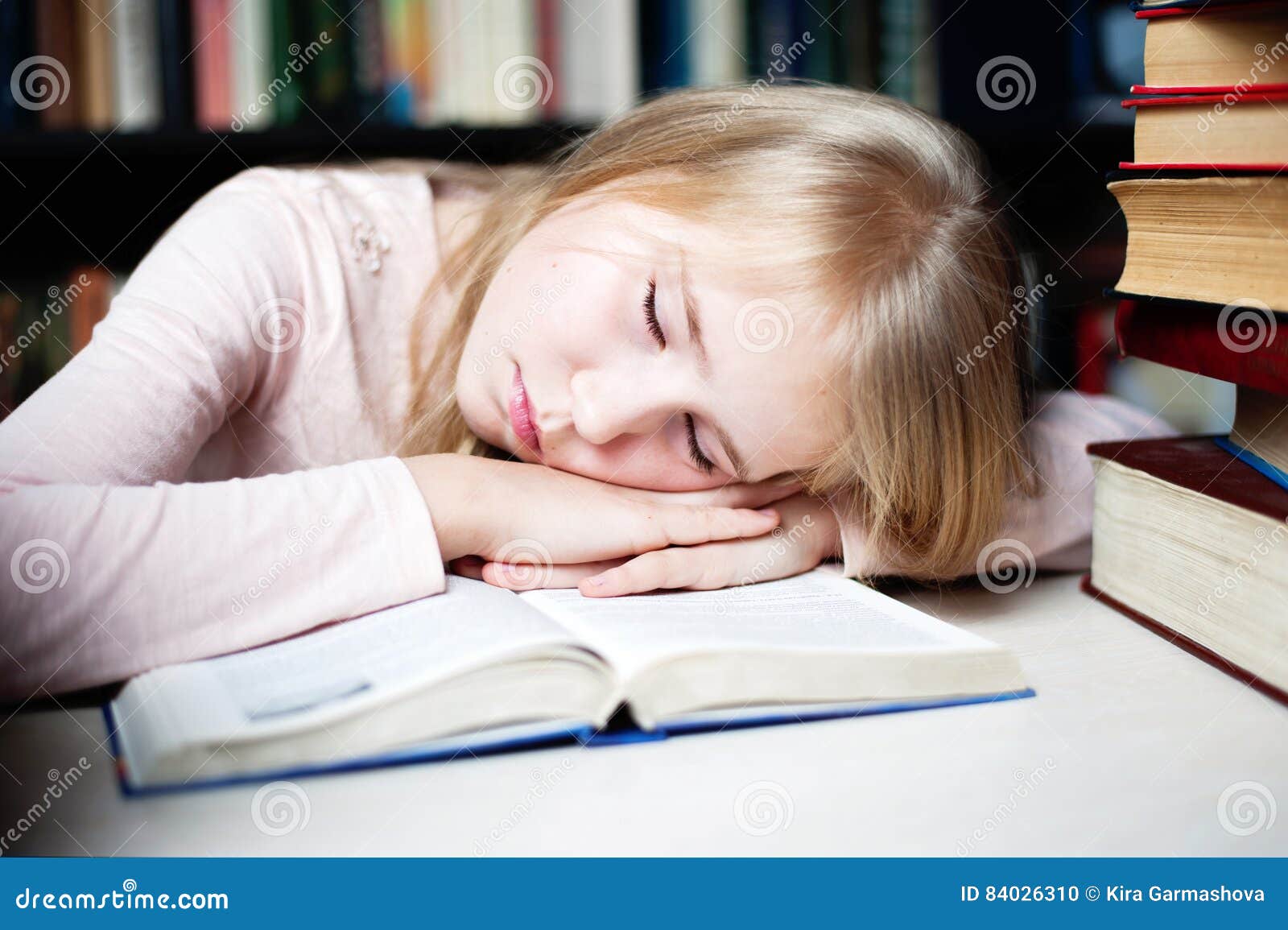 Cute Little Girl Lying Table Doing Her Homework Photos - Free & Royalty ...
