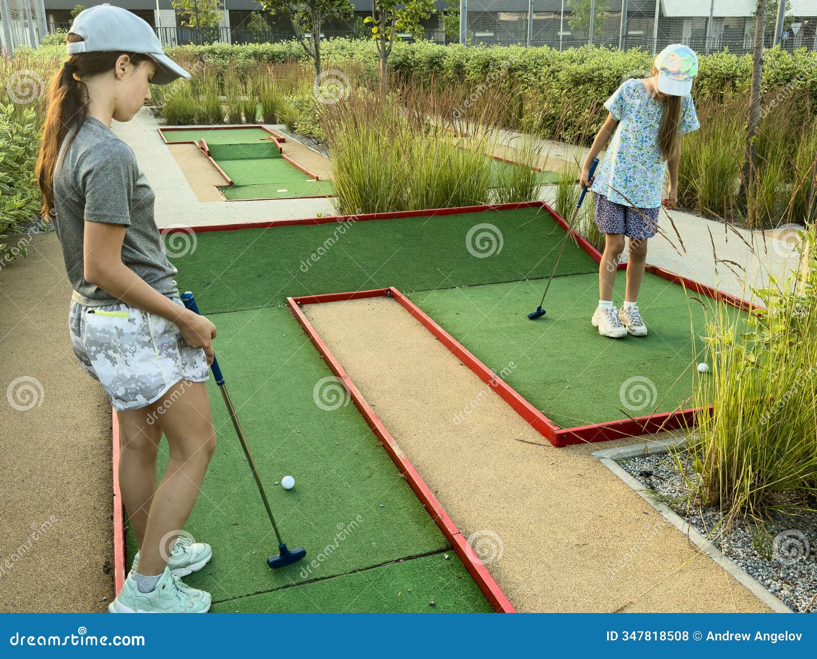 Cute Little Girl on a Miniature Golf Course Stock Photo - Image of ...
