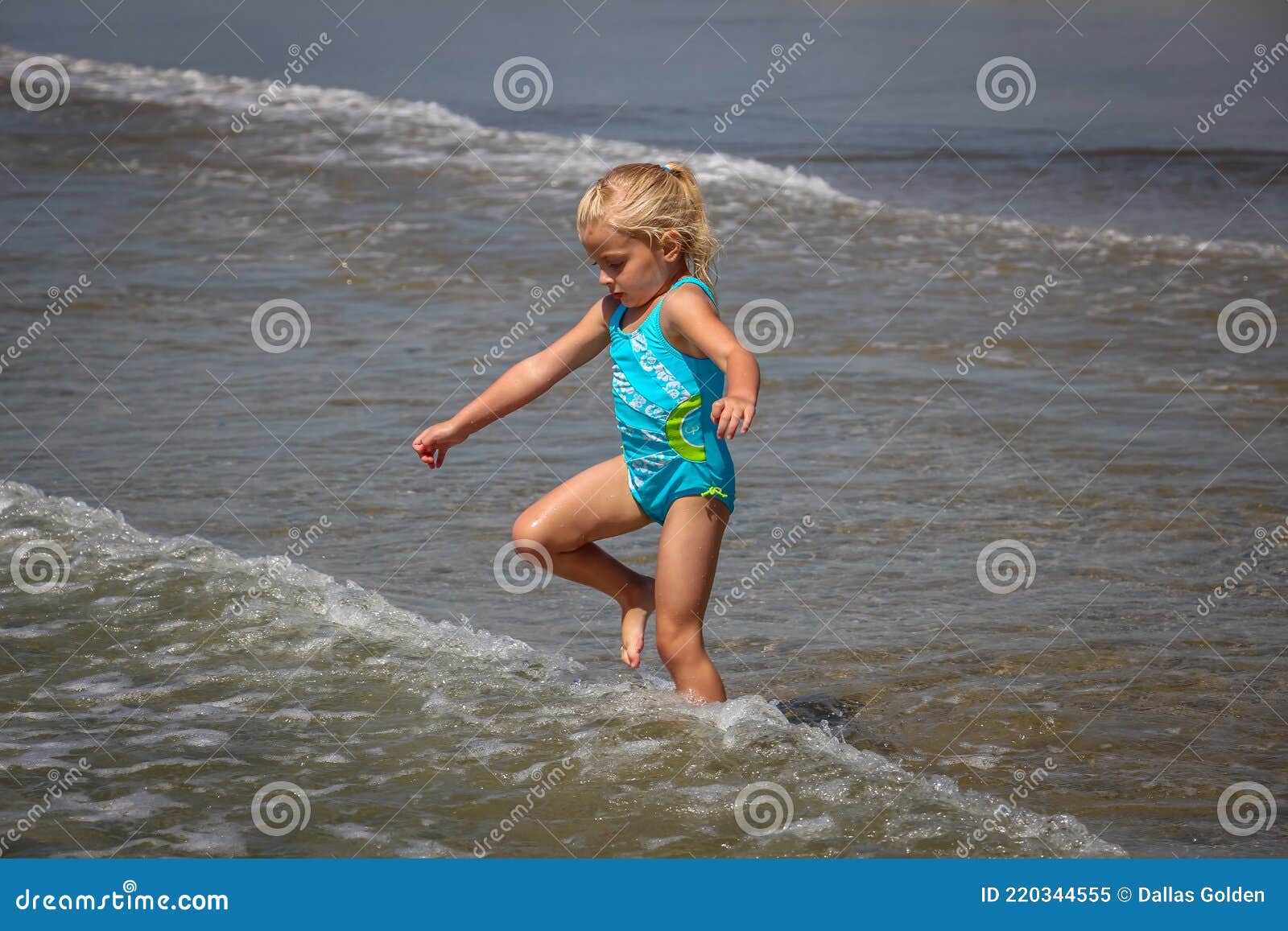 Cute Little Girl Playing in Waves at Beach Stock Image - Image of swim ...