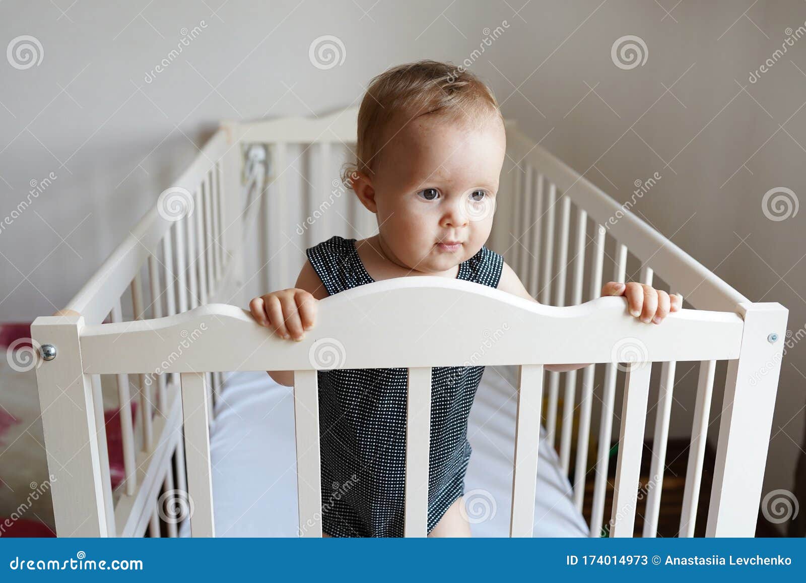 Cute Little Girl Standing in a White Round Bed Stock Image - Image of ...
