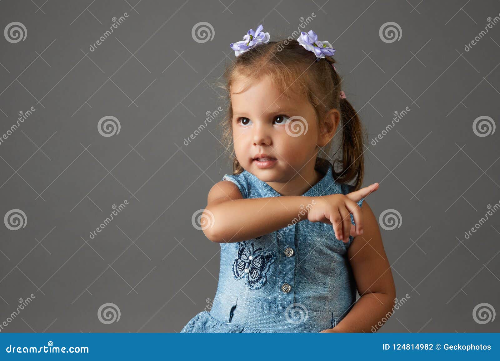 Cute Little Girl Touching Screen. Gray Background Stock Photo - Image ...
