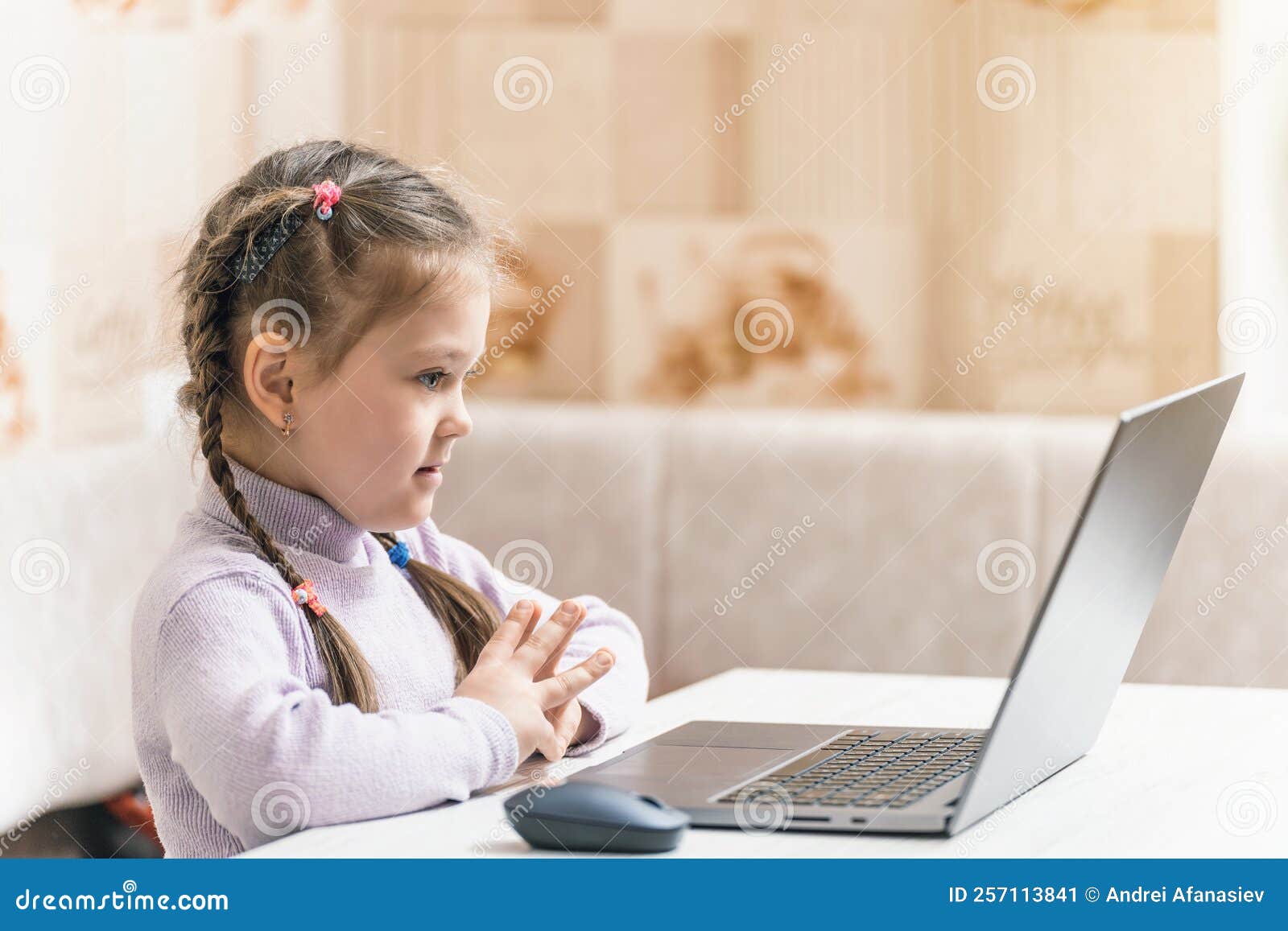 Cute Little Girl Using Laptop Computer for Online Learning Stock Image ...