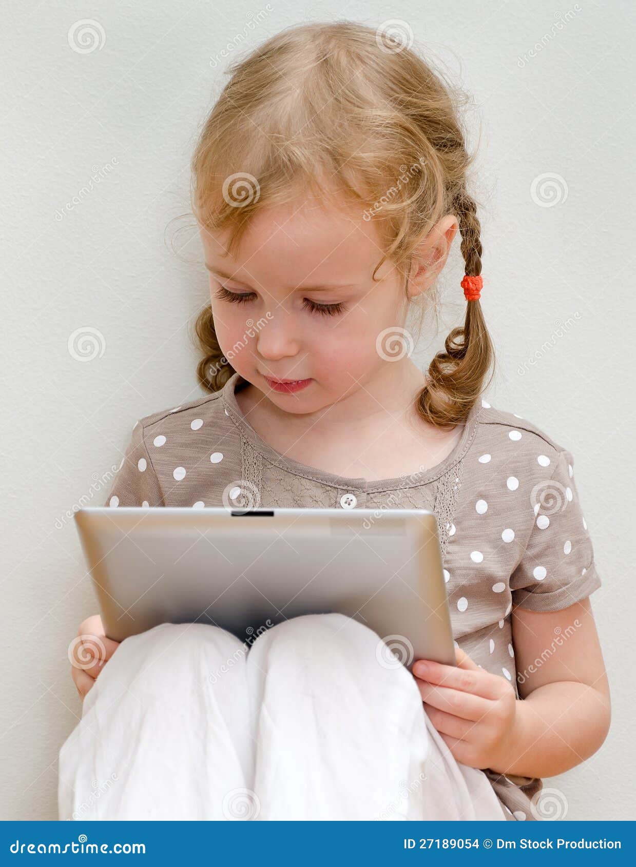 Cute Little Girl Using Tablet Computer Stock Photo - Image of innocence ...
