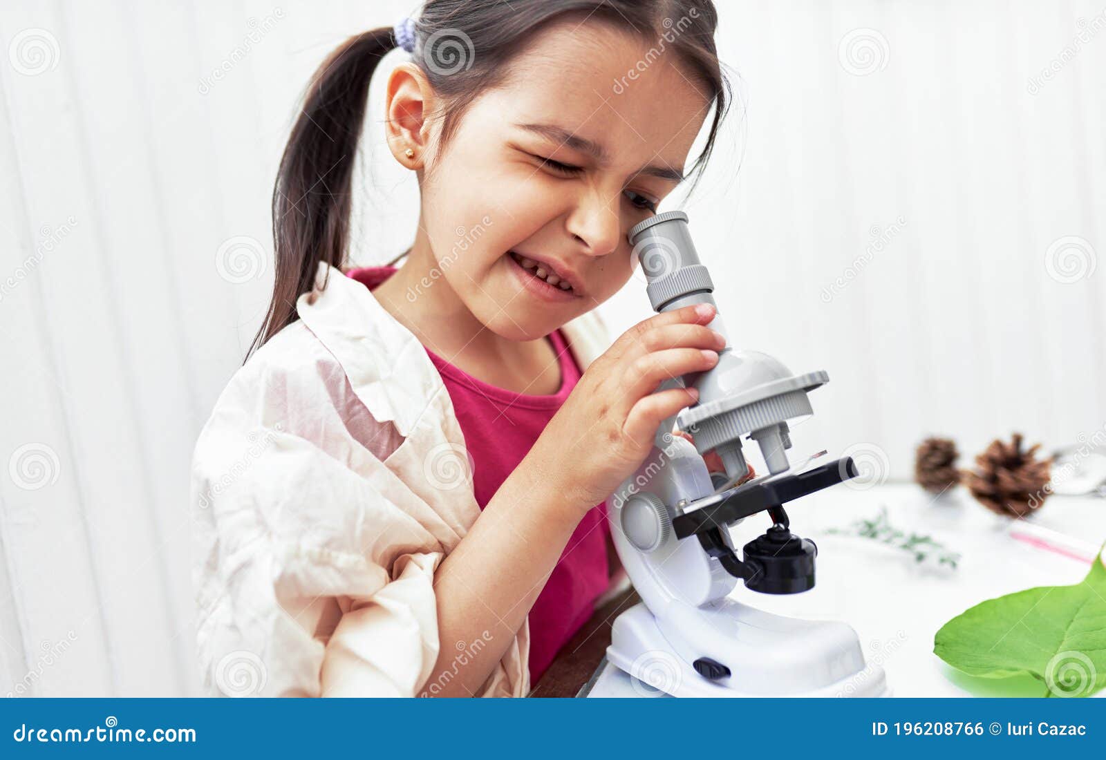 Cute Little Girl Working with Microscope and Exploring Plants. the ...
