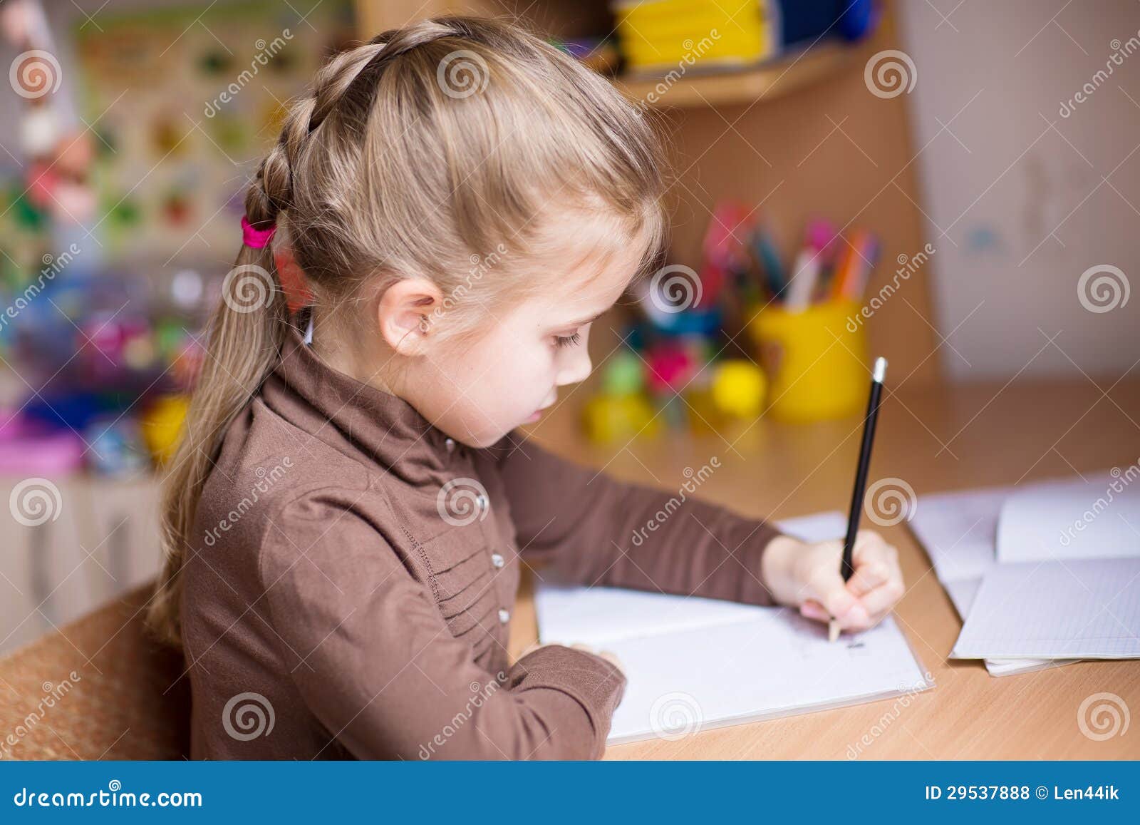 Cute Little Girl Writing Her Homework Stock Photo - Image of drawing ...