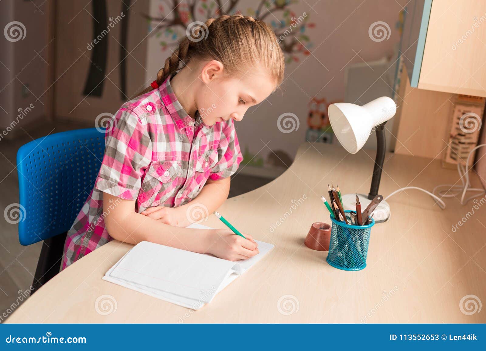 Cute Little Girl Writing Her Homework Stock Image - Image of female ...