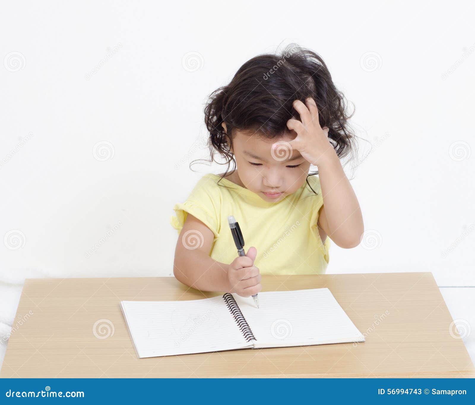 Cute Little Girl Writing Something Stock Image - Image of beautiful ...