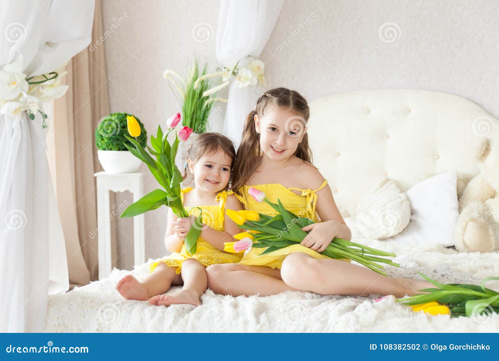 Cute Little Girls in Spring Studio Stock Photo - Image of pastel ...