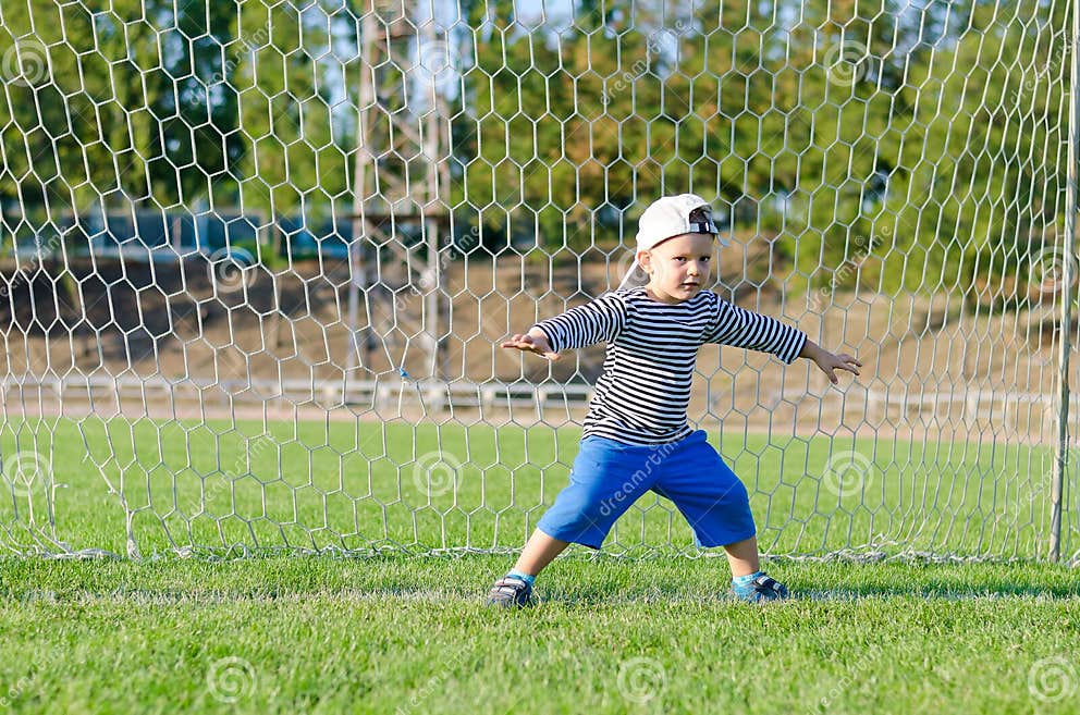 Cute little goalkeeper stock photo. Image of back, outdoors - 29036866